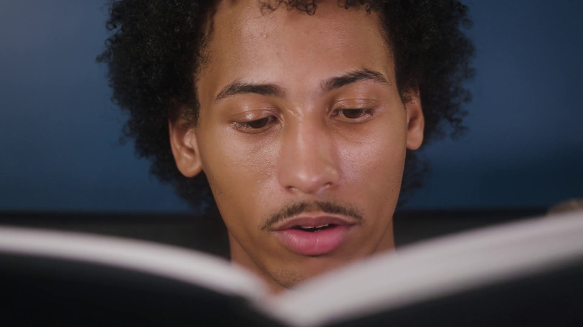 Young Black Reading Book Out Loud (ecu) Stock Footage SBV-346673293 ...