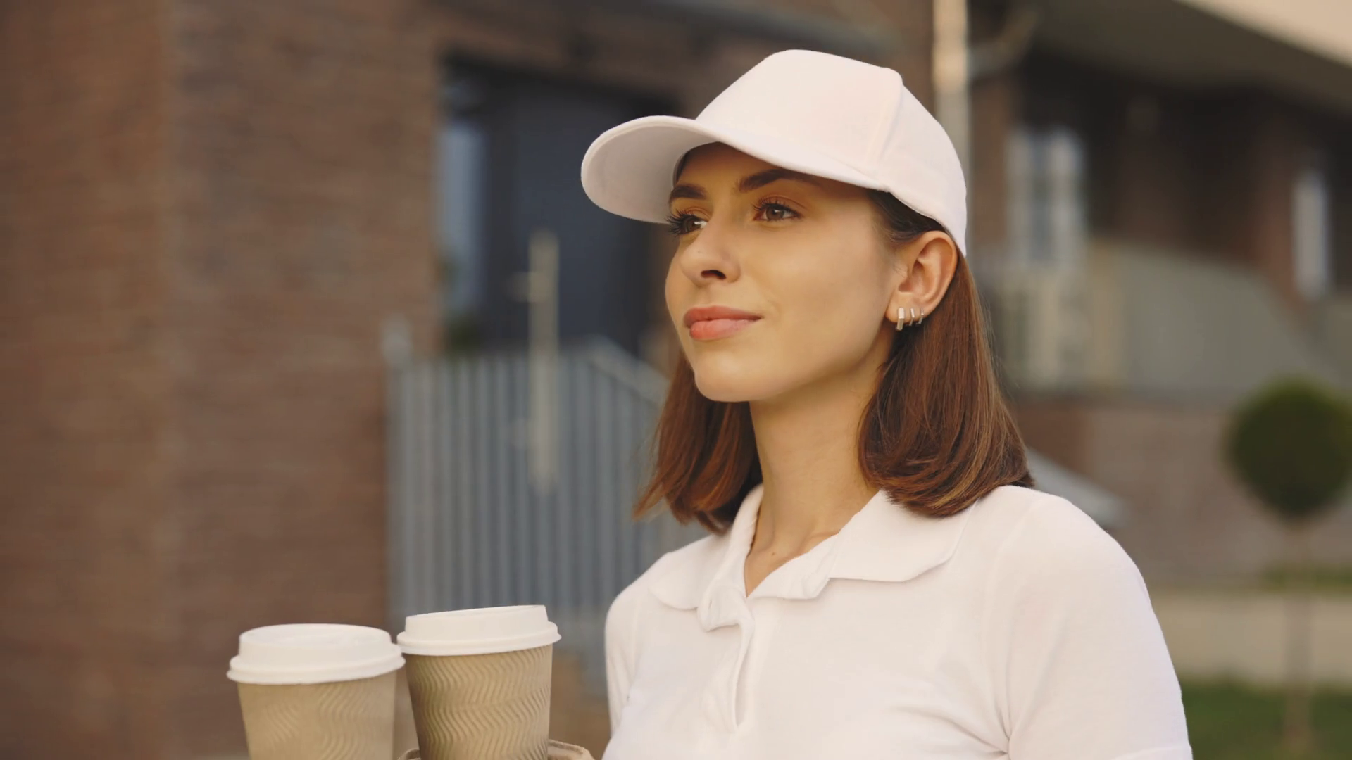 Positive Cute Woman Courier In Special White Stock Footage SBV ...