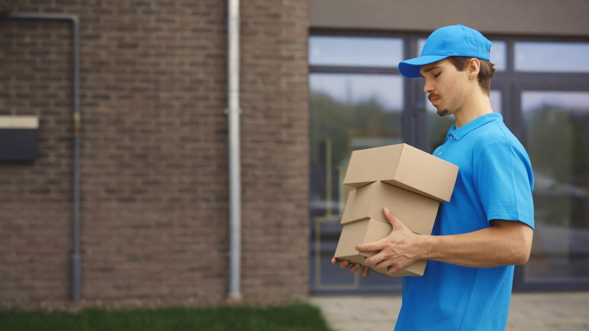 Side View Of Caucasian Male Postman Walking Stock Footage SBV-348431227 ...
