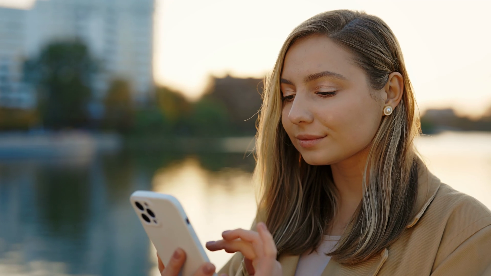 Young Woman City Lake: Smartphone Use & Stock Footage SBV-347729170 - Storyblocks
