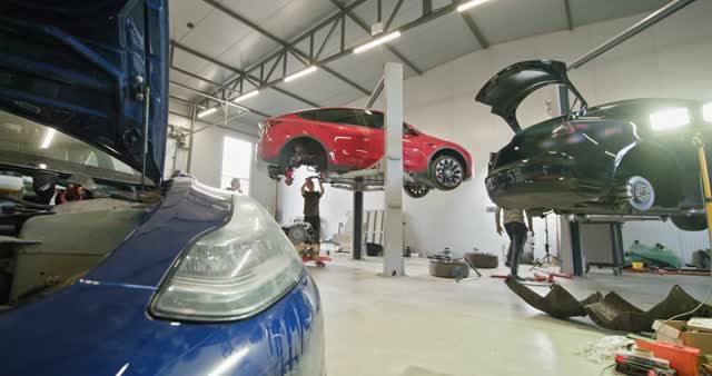 Working On A Car Stock Footage: Royalty-Free Video Clips - Storyblocks