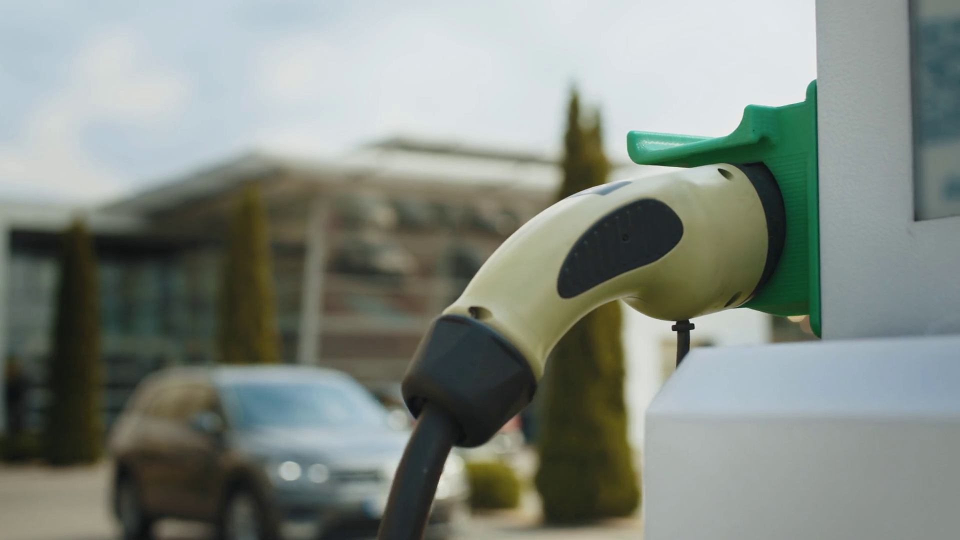 Hand Pulling In Cable From Ev Car Charger Stock Footage SBV-348510613 ...