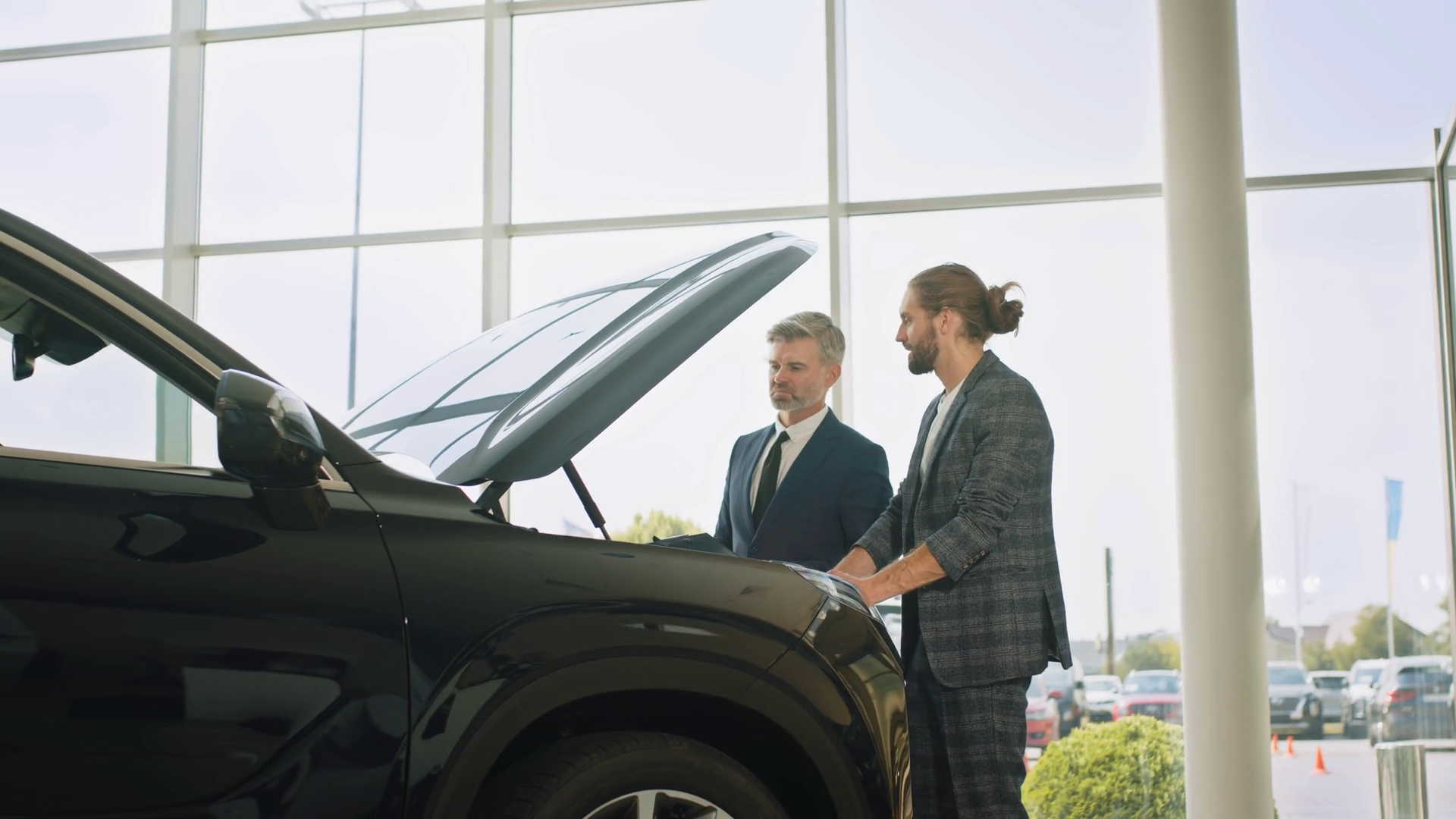 Salesperson With Client In Car Showroom Near Stock Footage SBV ...