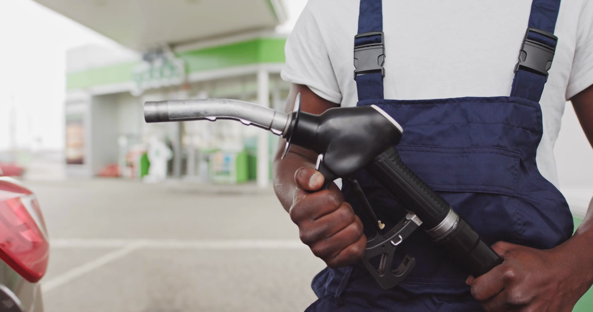A Black African Refueling Worker Holds Gun Stock Footage SBV-348544759 ...