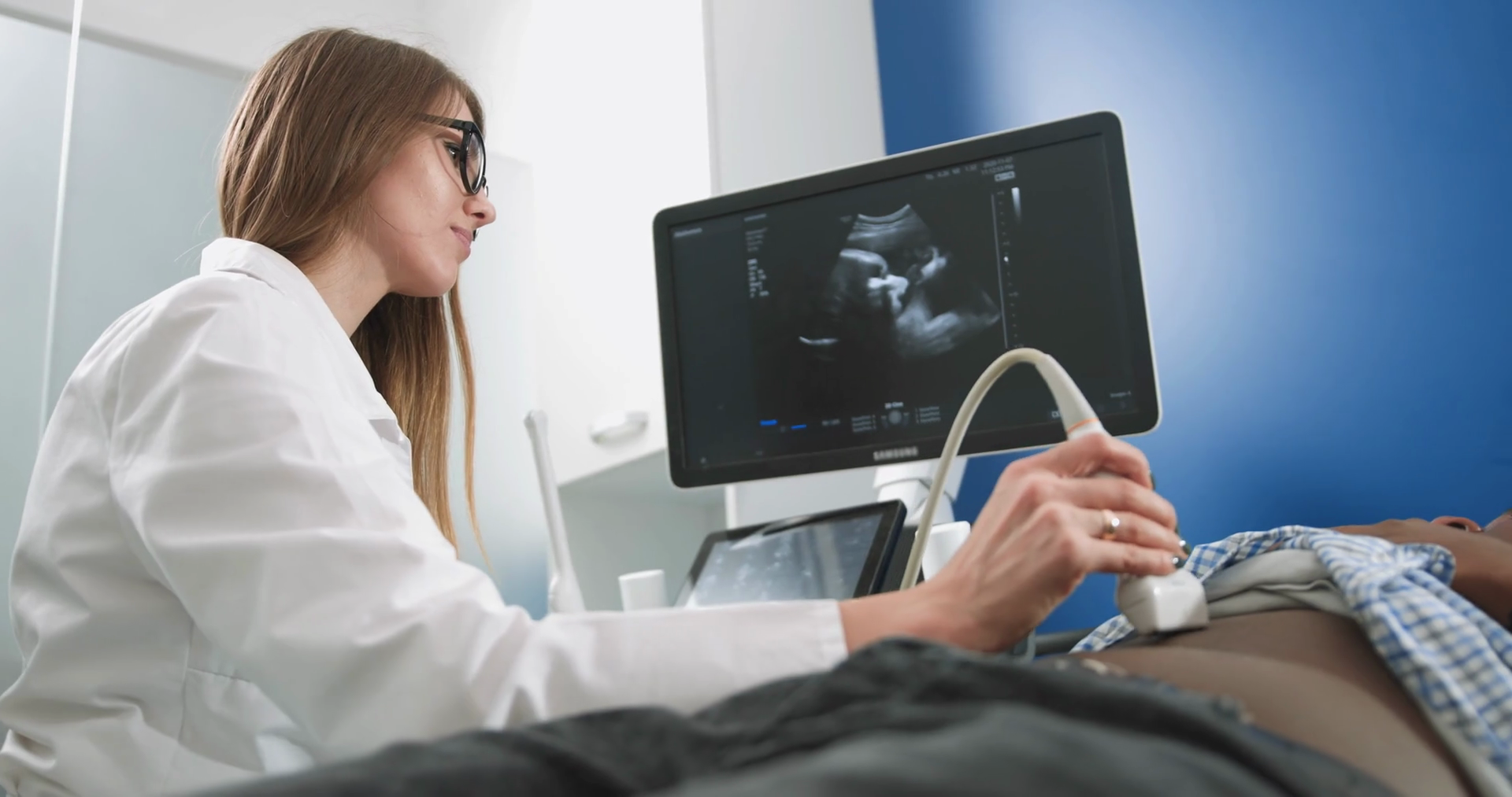 Focused Female Doctor Performs Ultrasound Stock Footage SBV-348550482 ...