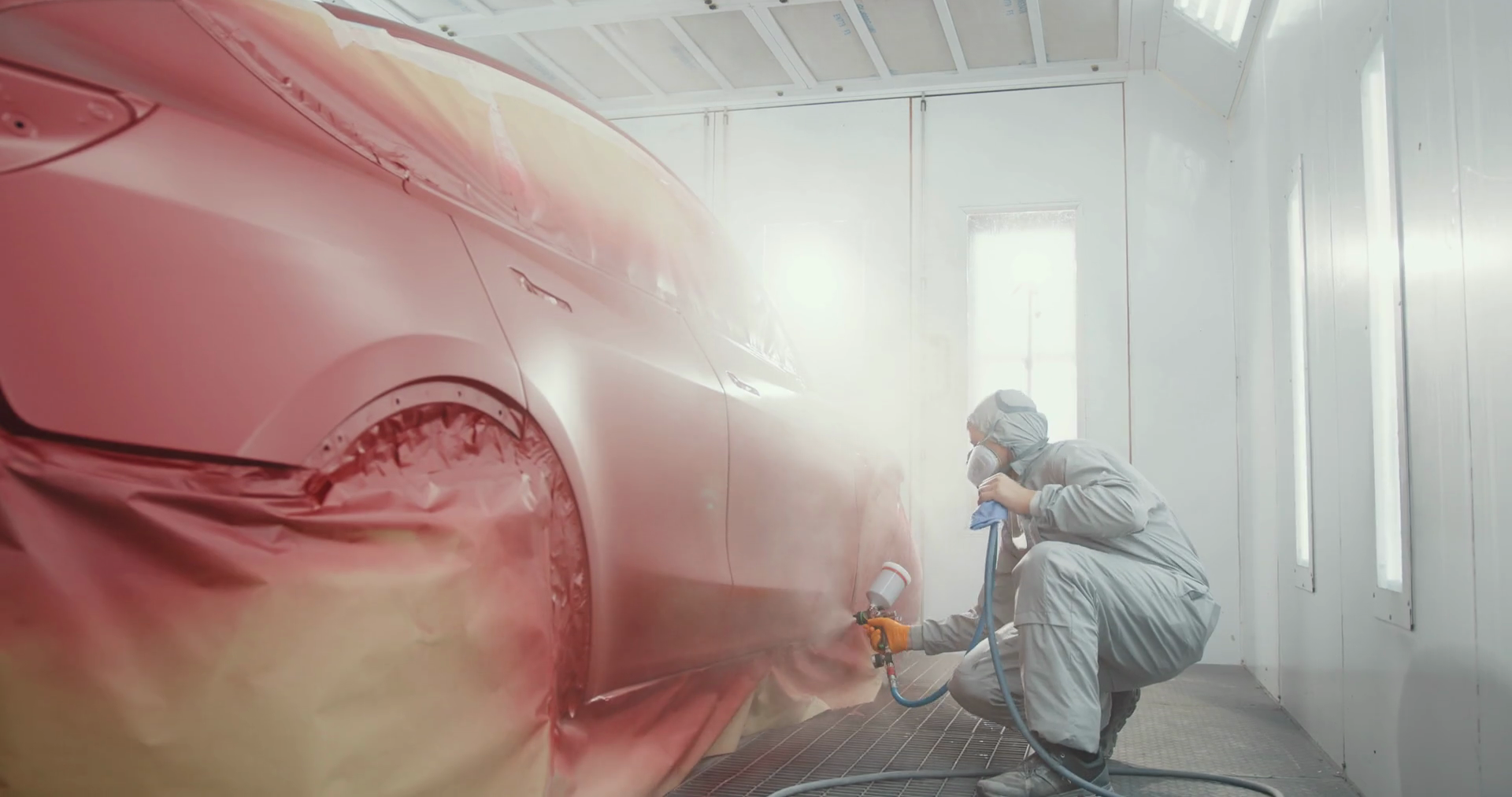 Person Spray Painting Car In Red Color In Stock Footage SBV-348650585 ...