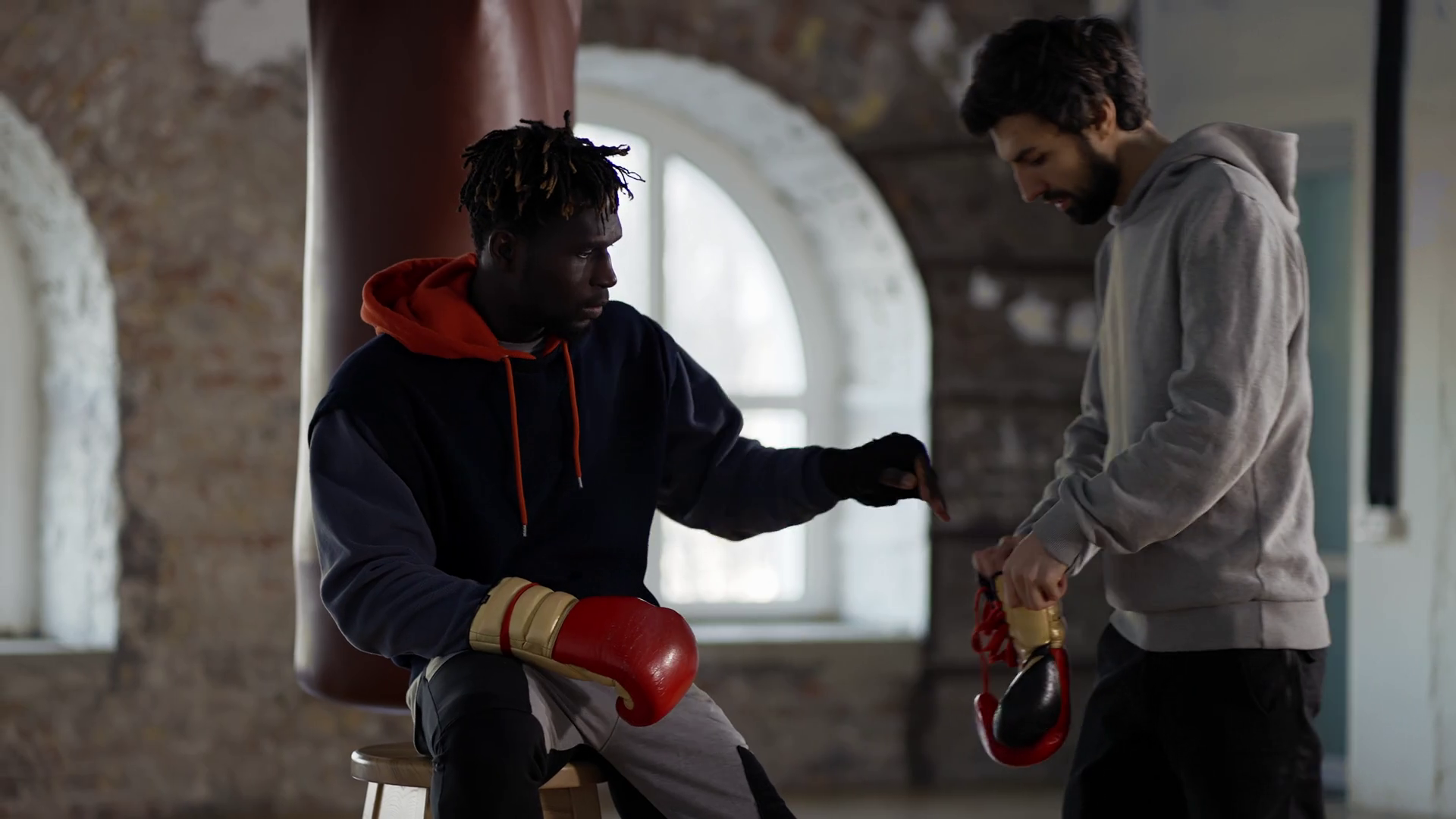 Assistant Helping To Put On Boxing Gloves To Stock Footage SBV ...