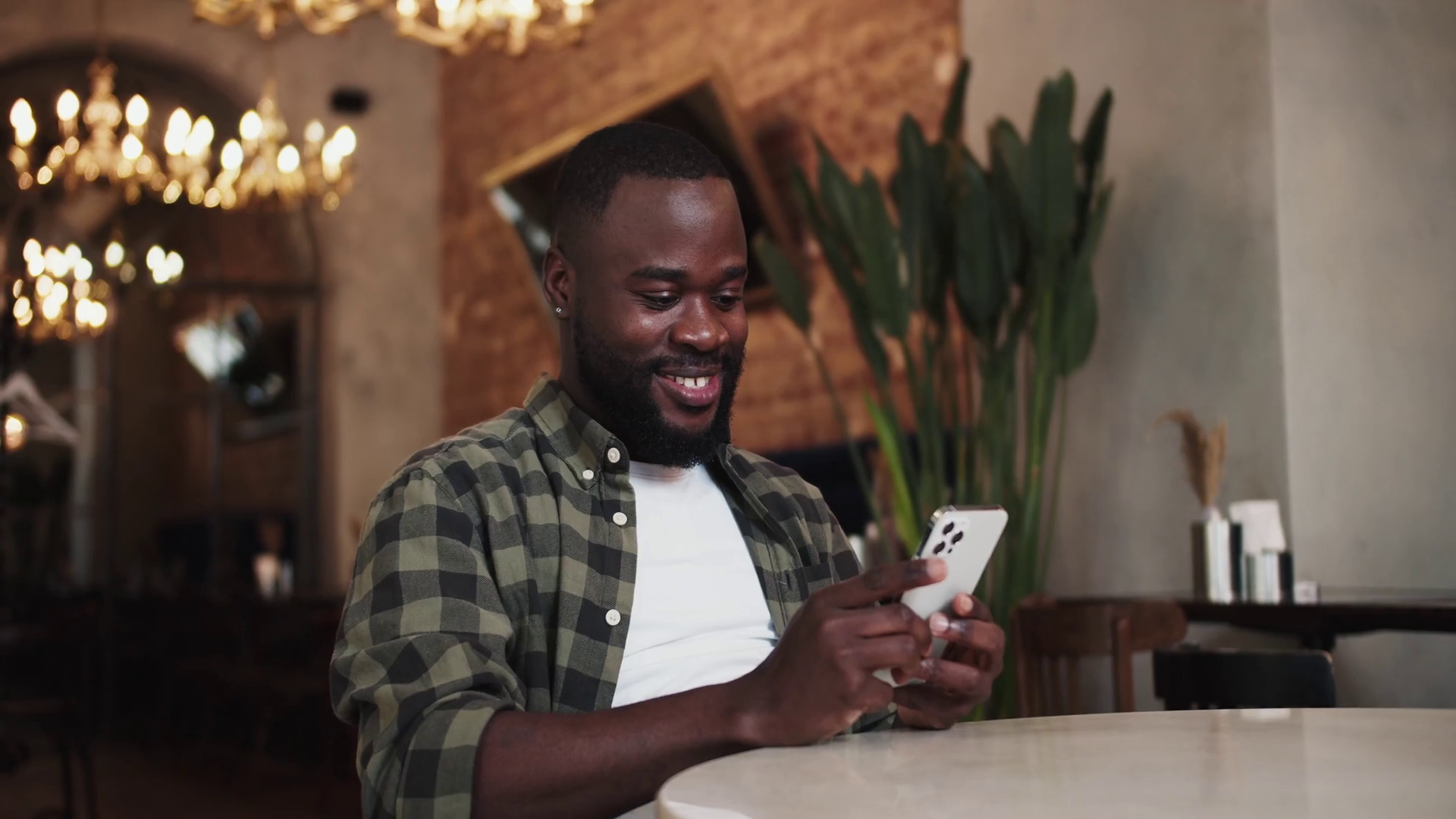 A Black Person Using Phone In In Cafe Stock Footage SBV-347754657 ...