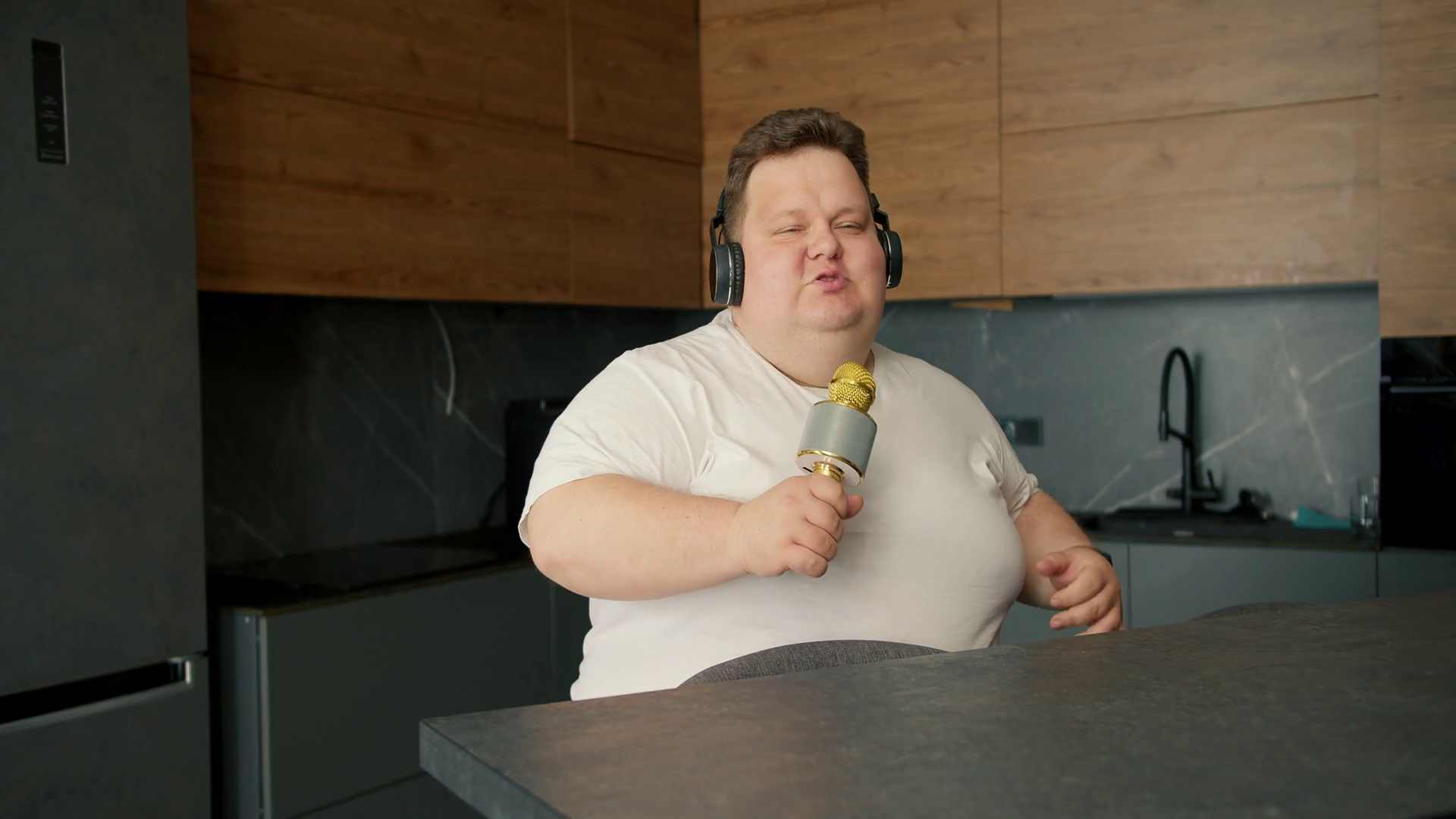 Obese Guy In Black Headphones Listens To Stock Footage SBV-347788449 ...