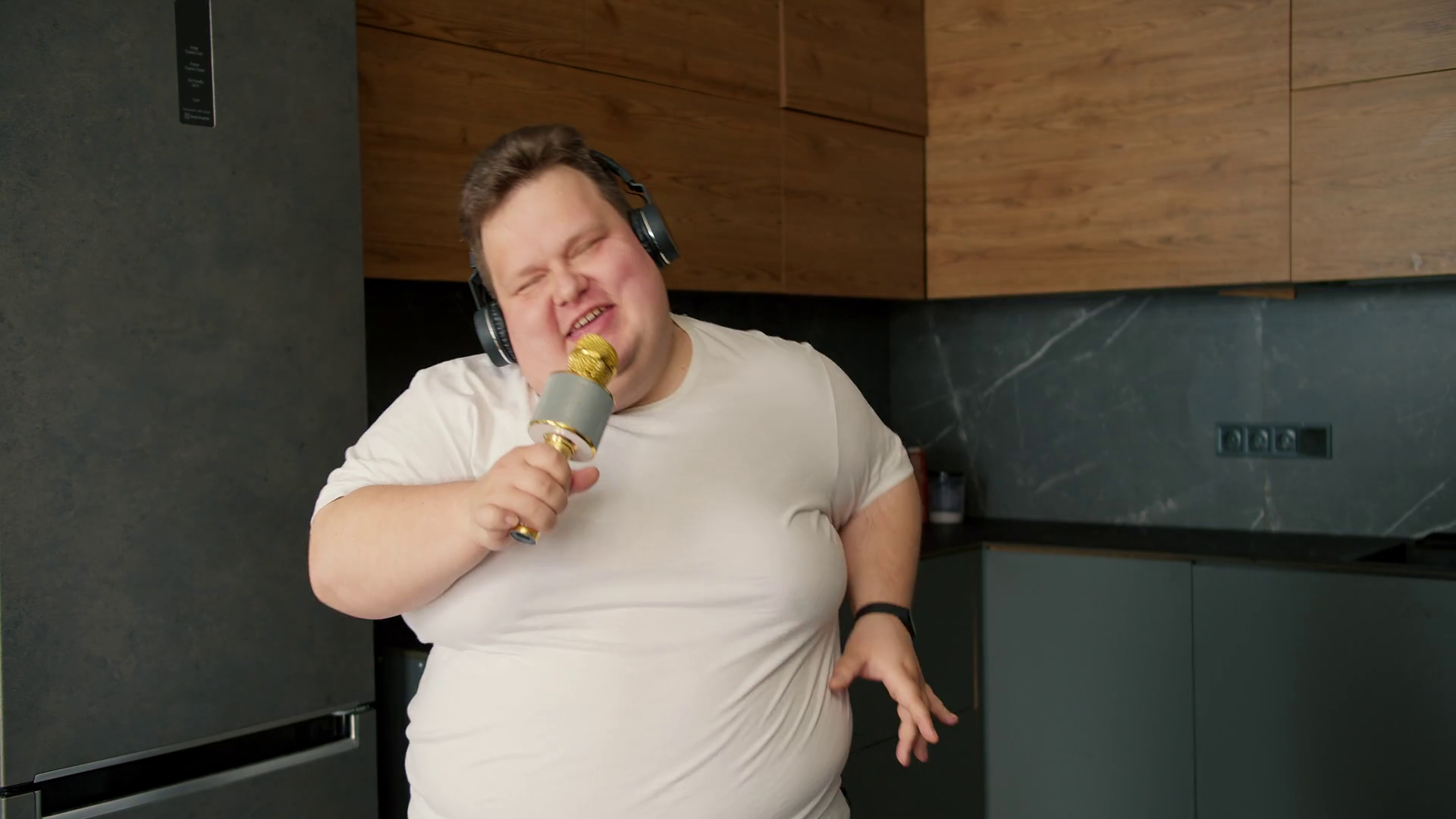 Obese Guy In Black Headphones Listens To Stock Footage SBV-347788454 ...