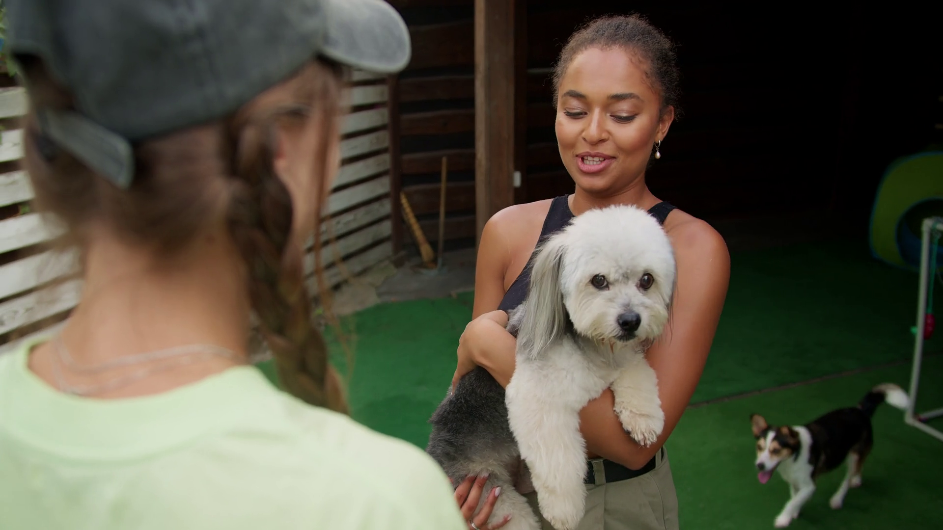 A Cheerful Mixed Race Girl In Black T-shirt Stock Footage SBV-348434089 ...