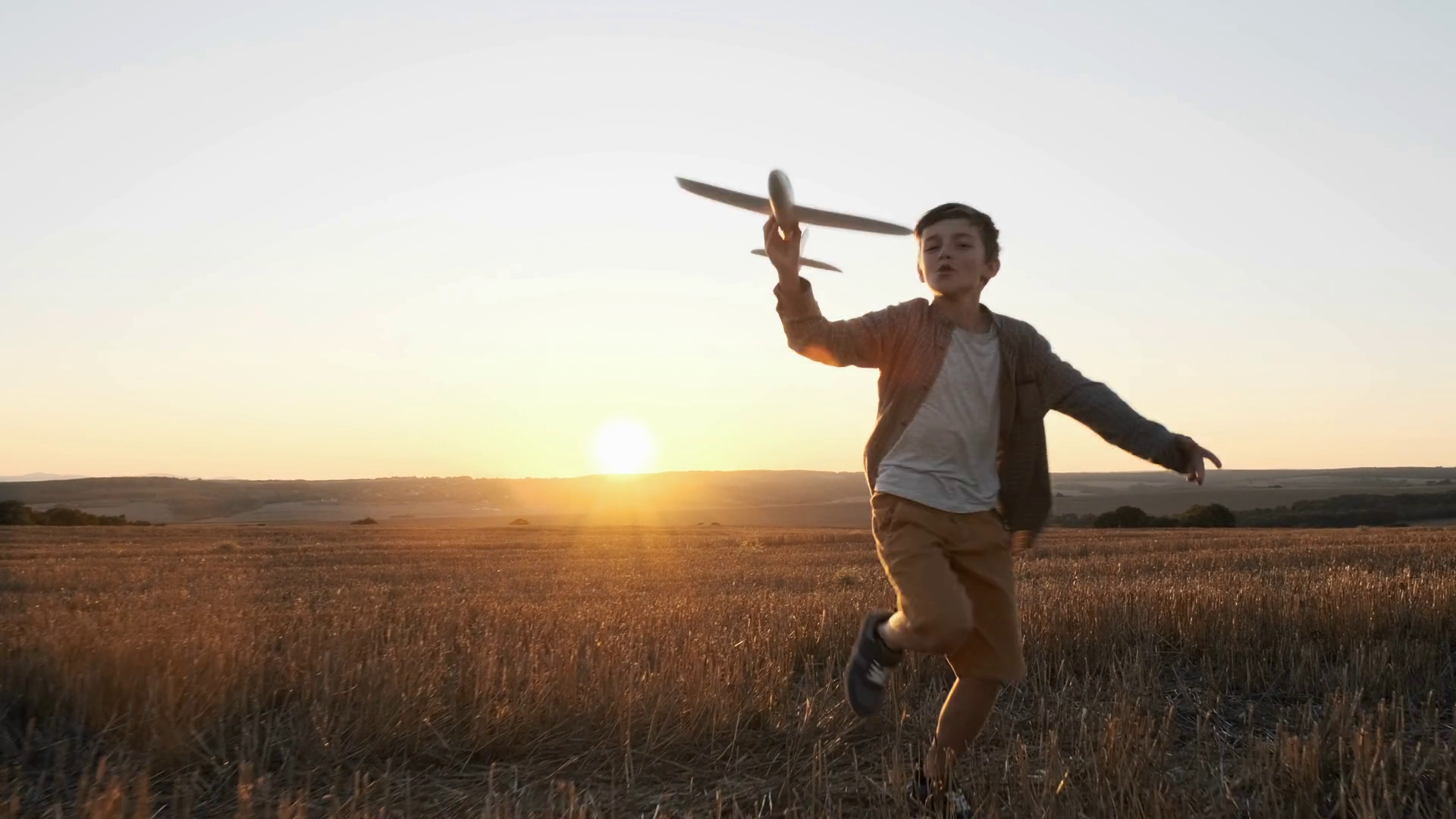 Happy Boy Running With White Toy Plane On Stock Footage SBV-347320258 ...