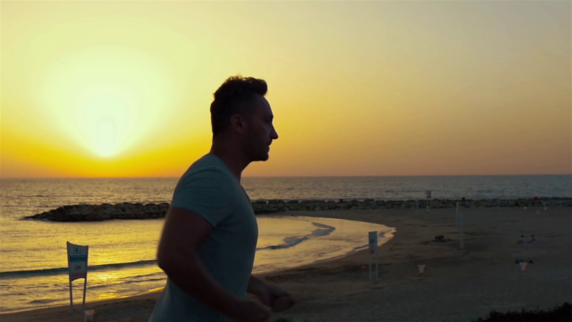 Man Running On Beach At Sunset Stock Footage SBV-308919944 - Storyblocks