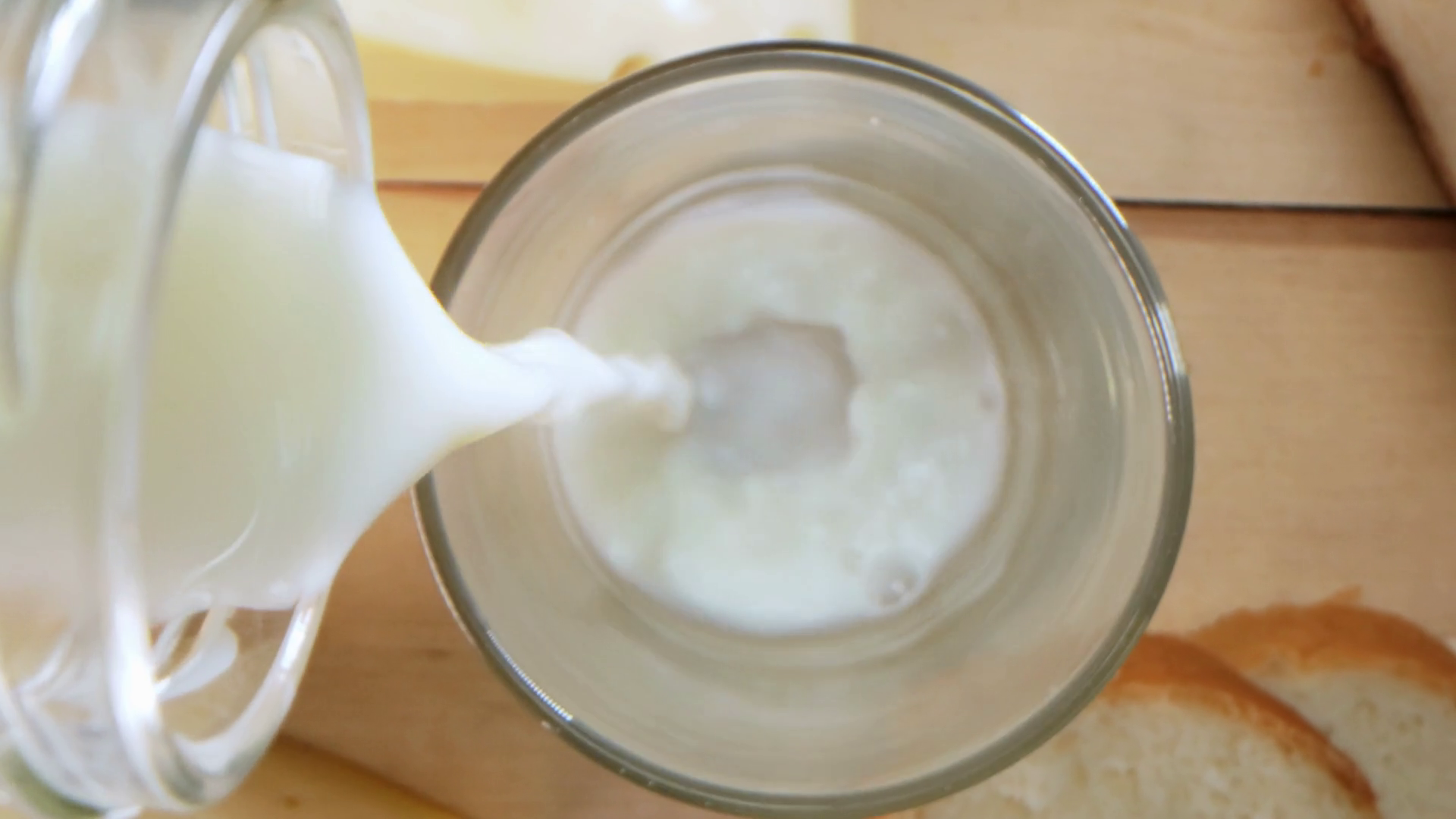Pouring Milk Into Clear Glass Standing On Stock Footage SBV-347296085 ...