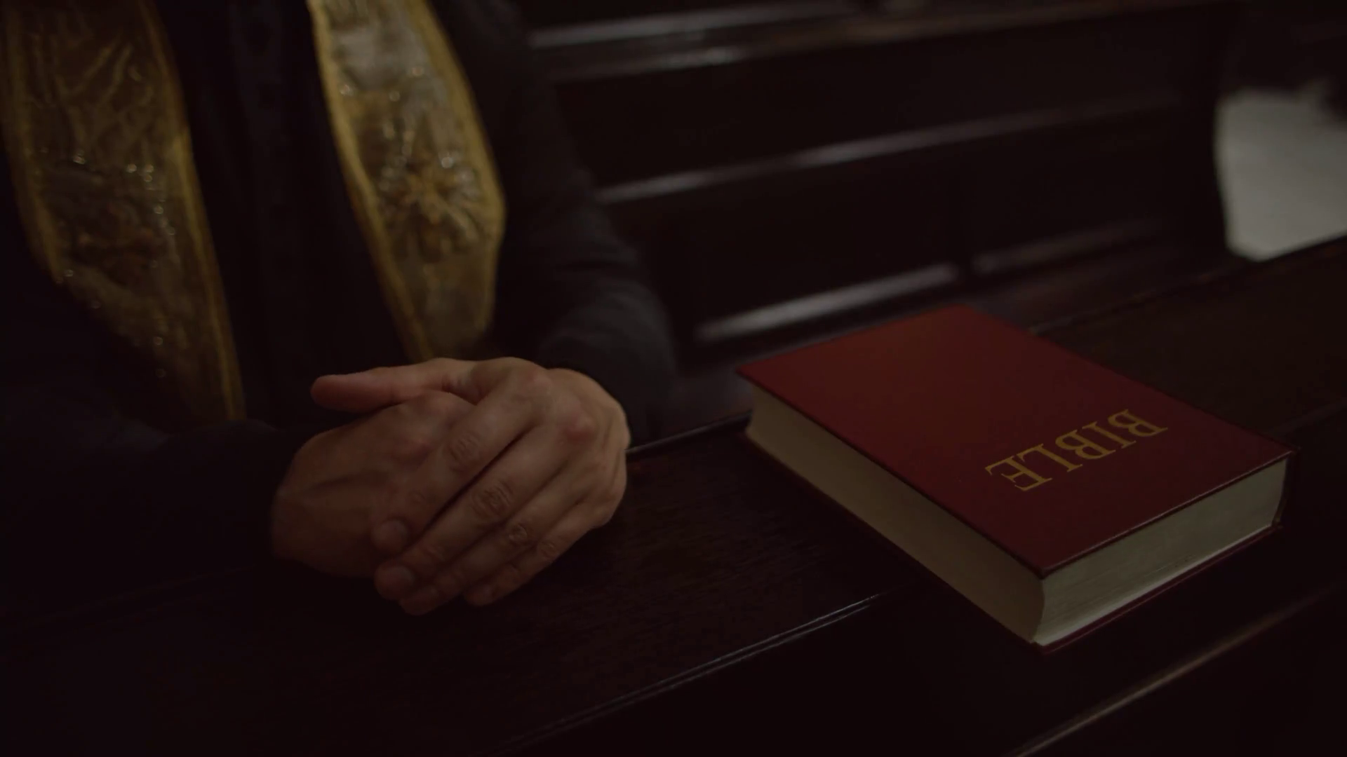 Priest Sitting On Church Bench Engaged In Stock Footage SBV-348723460 ...