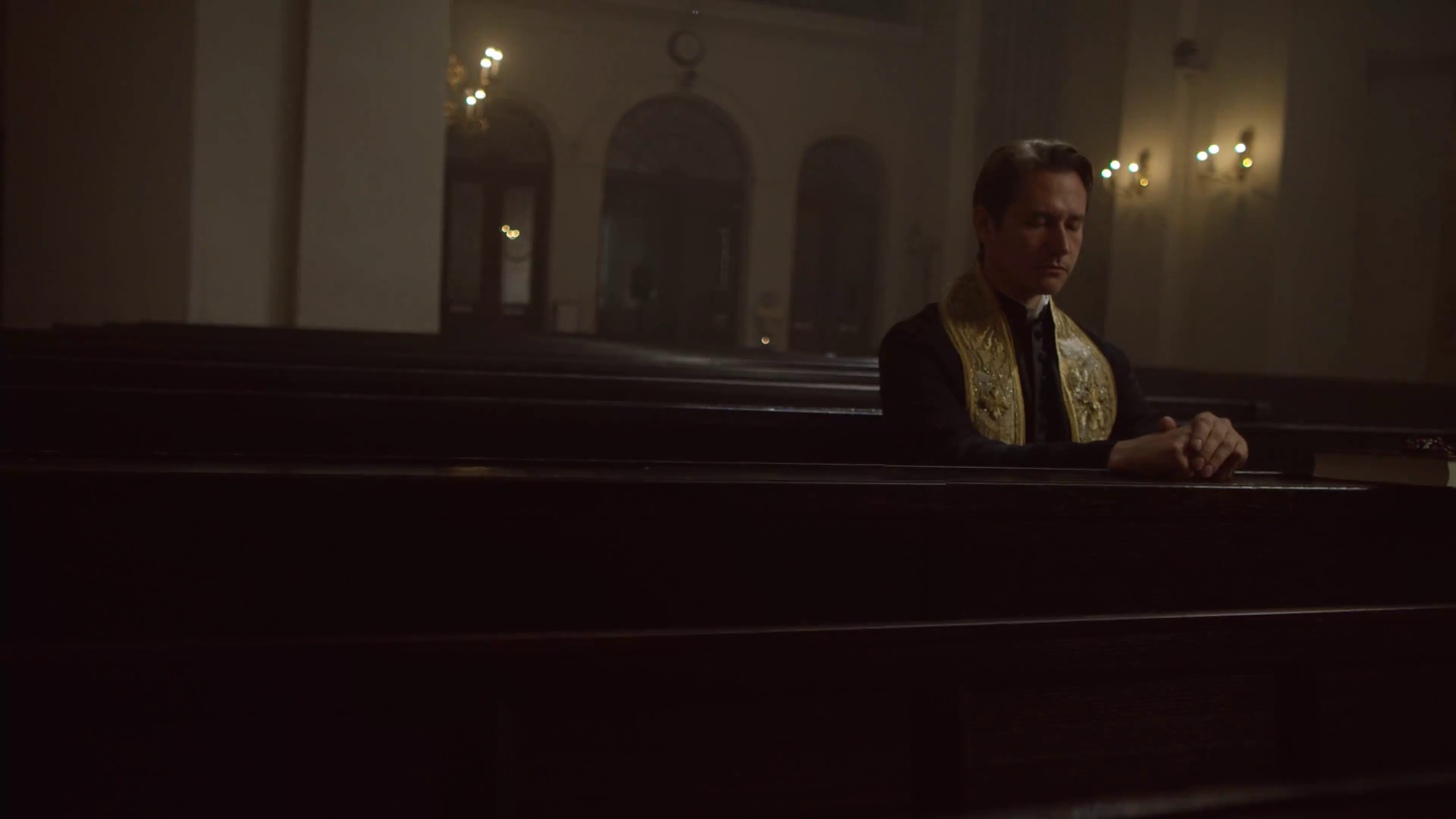 Priest Sitting On Church Bench Engaged In Stock Footage SBV-348723526 ...