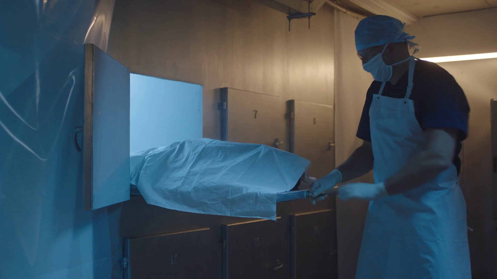 Attendant Removing Cadaver From Cold Storage Stock Footage SBV ...