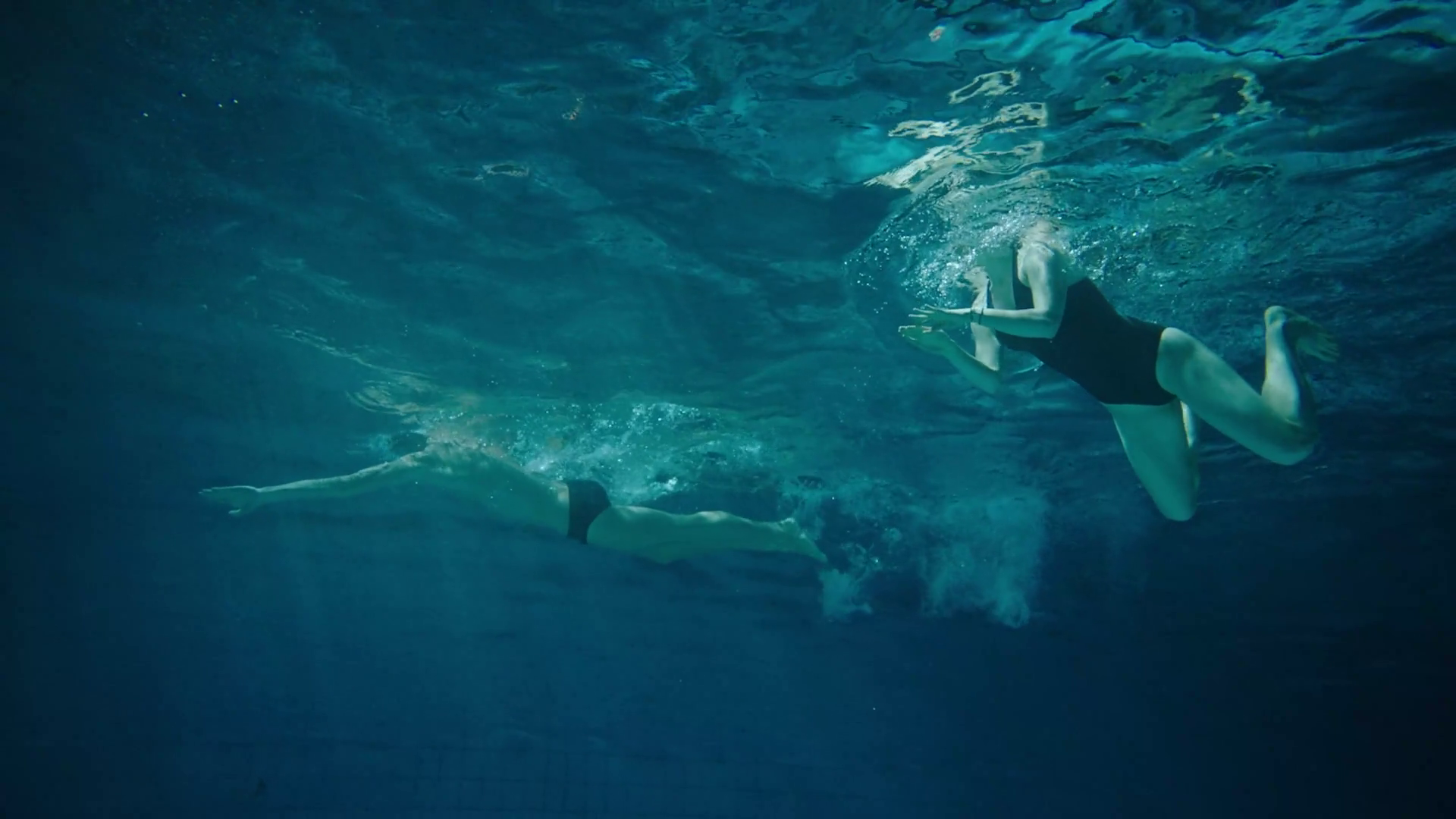 Watch Skilled Swimmers Glide Through Water Stock Footage SBV-348539566 ...
