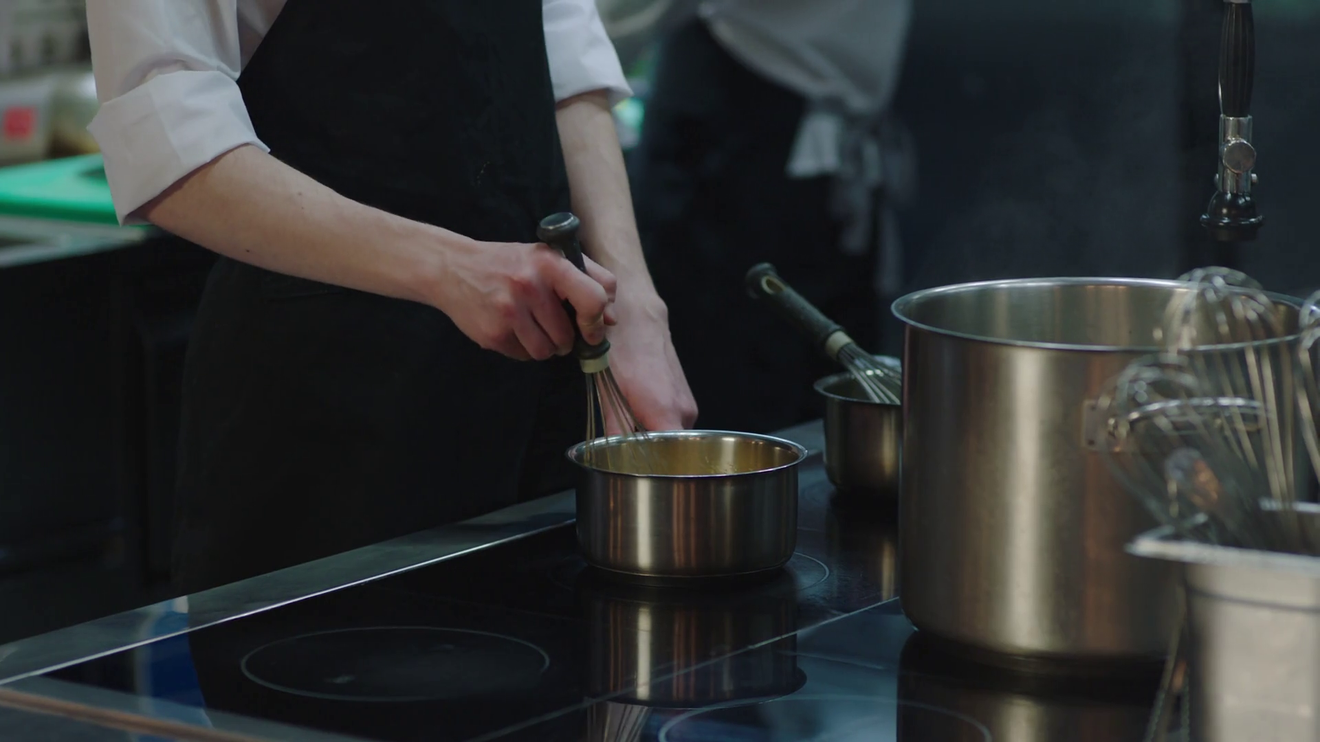 Kitchen Dynamics: Chef Expertly Maneuvering Stock Footage SBV-348628243 ...