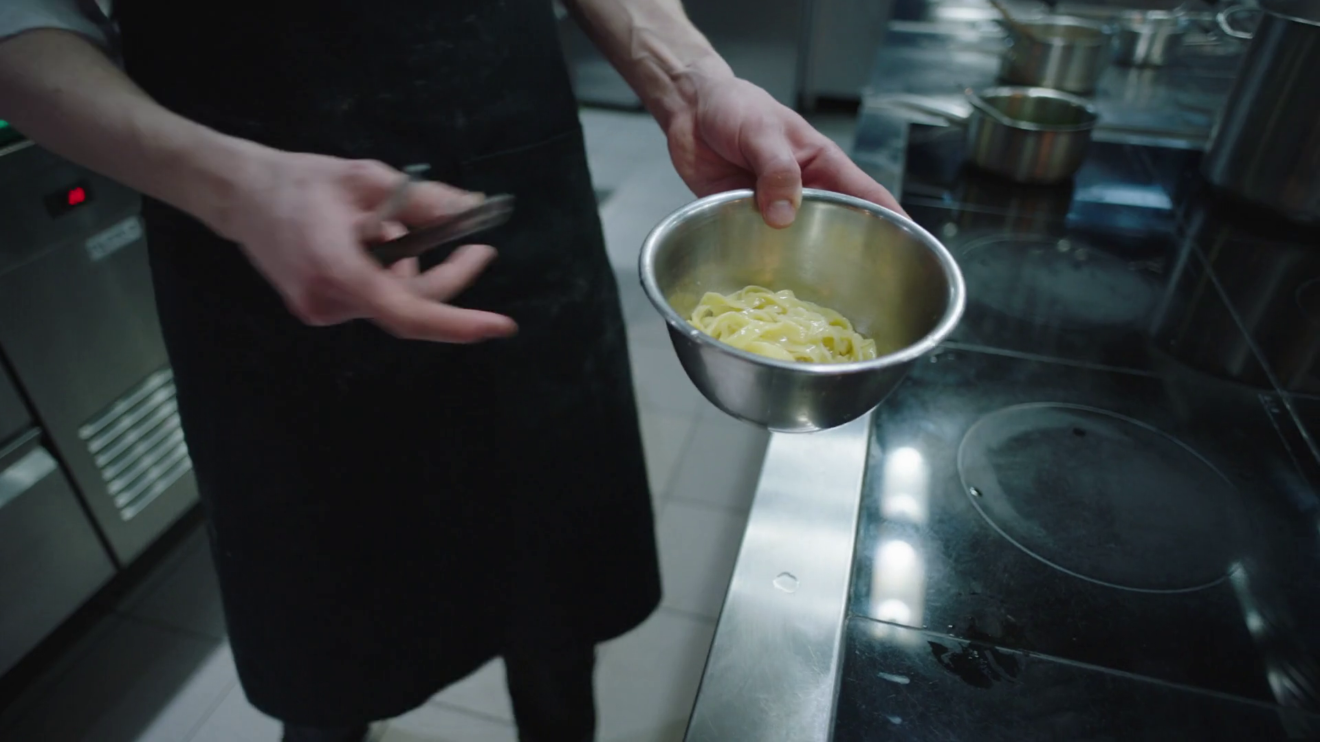 Kitchen Dynamics: Chef Expertly Maneuvering Stock Footage SBV-348628289 ...