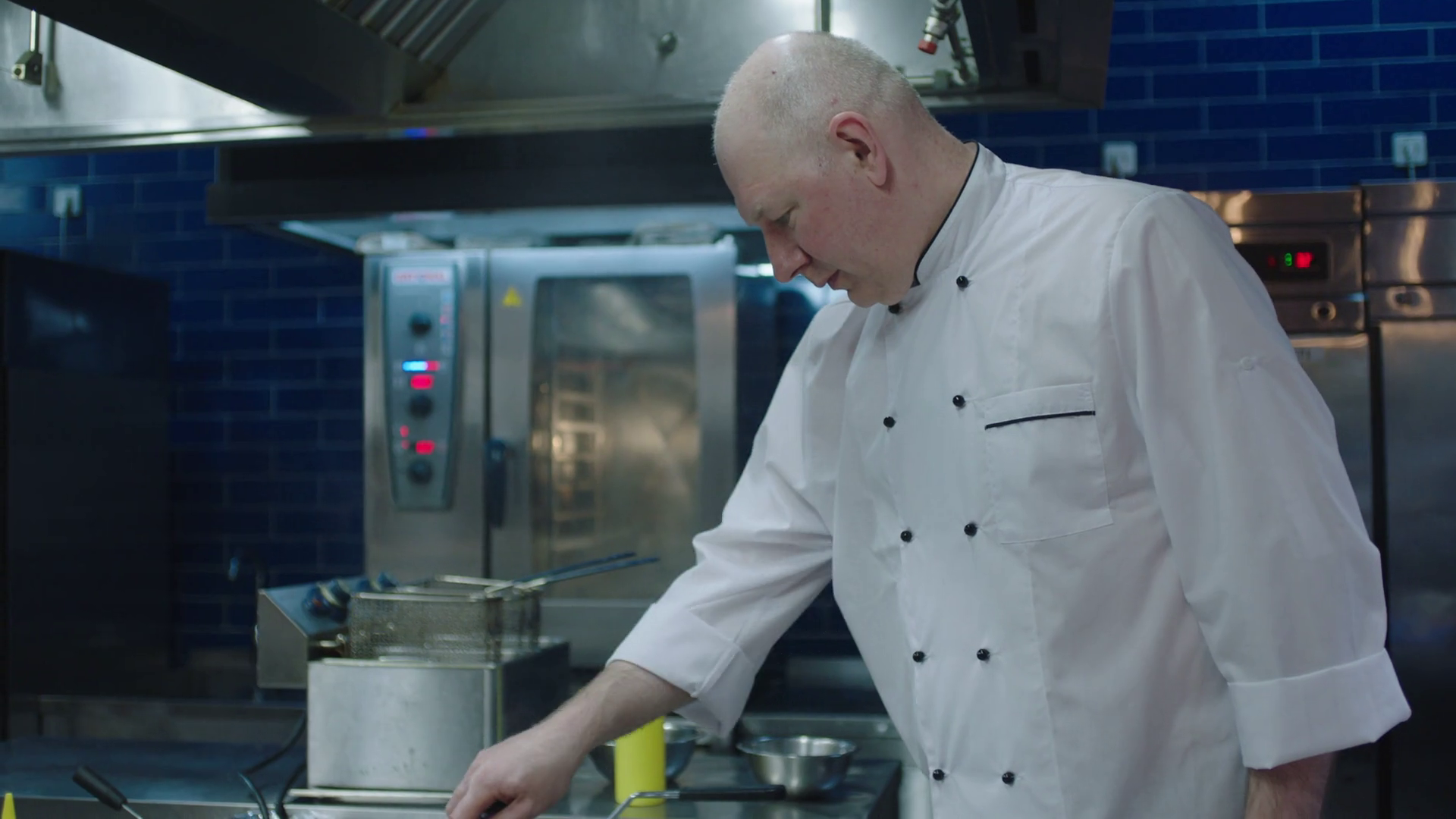 A Chef's Kitchen: Preparing Delicious Dishes Stock Footage SBV ...