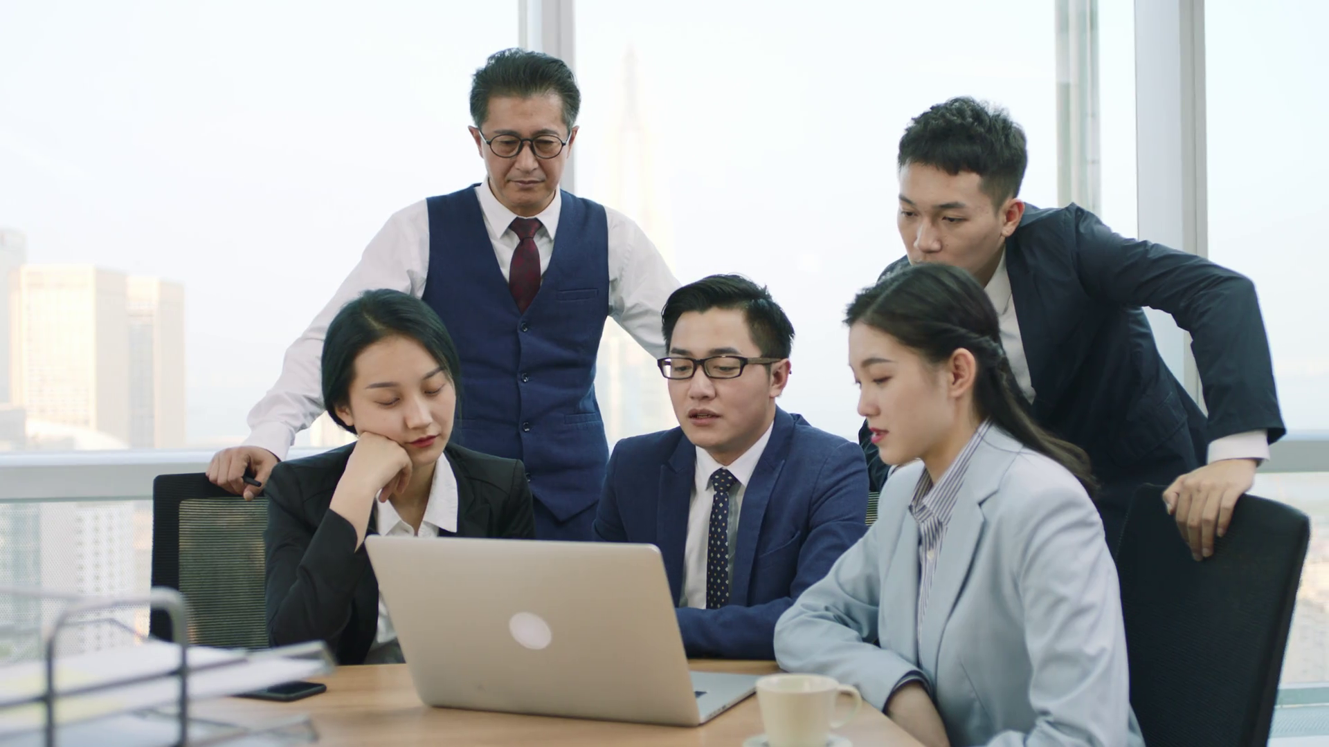 Team Of Asian Businesspeople Discussing Stock Footage SBV-347309790 - Storyblocks