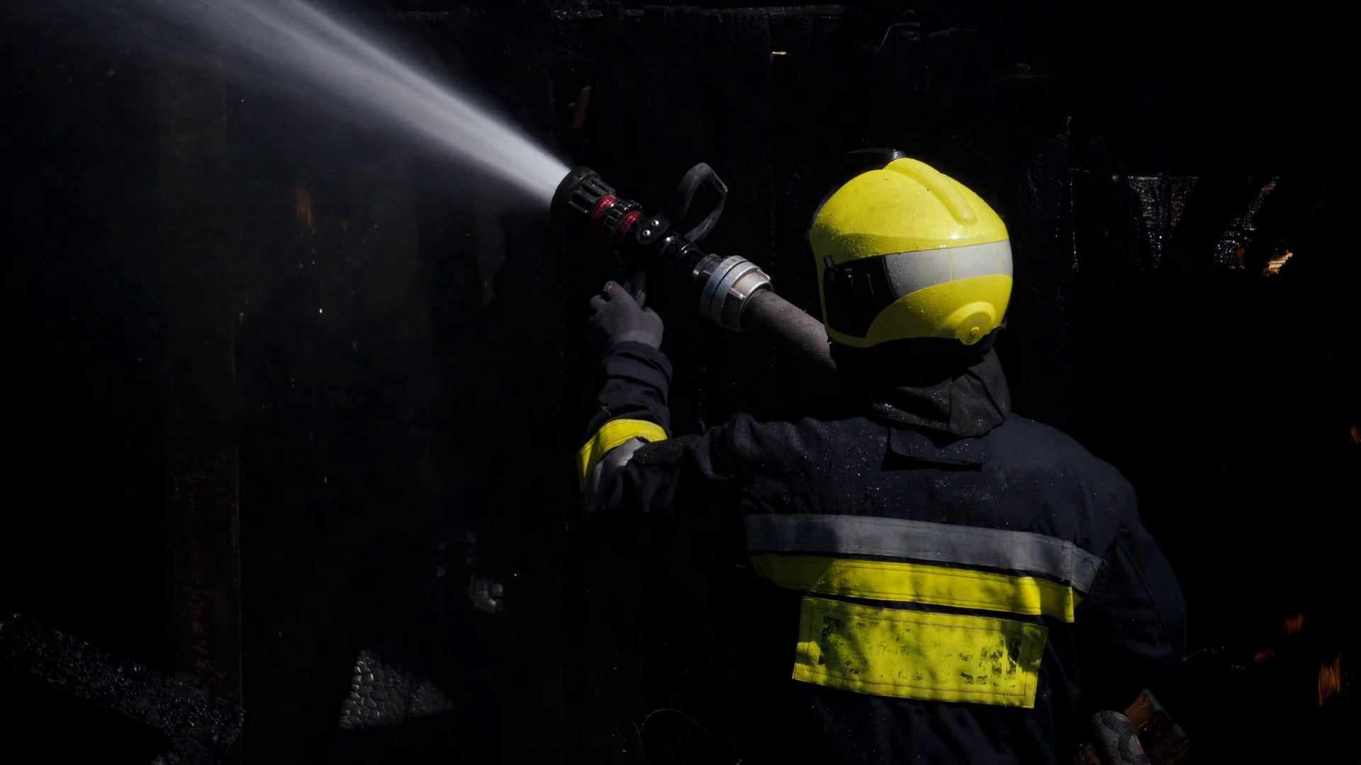 Firefighter Trying To Extinguish House On Stock Footage SBV-352313888 ...