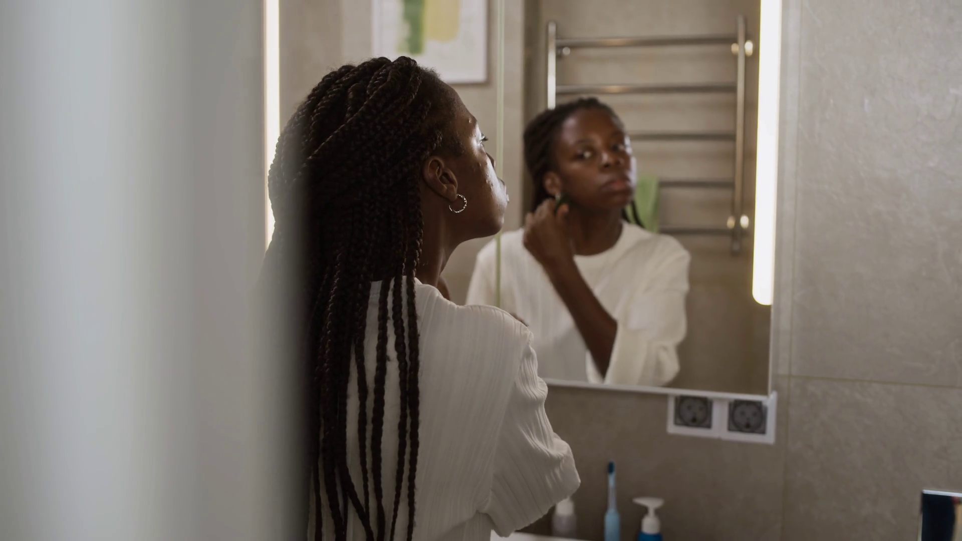 Young Black Woman Using Gua Sha Stone To Stock Footage SBV-353478229 ...