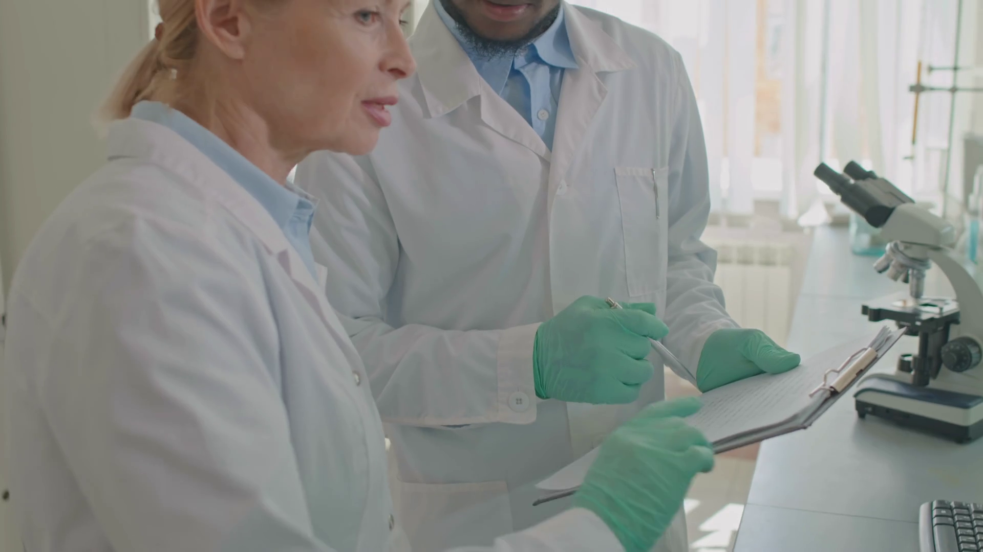 Two Multiethnic Biotechnologists In White Stock Footage SBV-348589551 ...