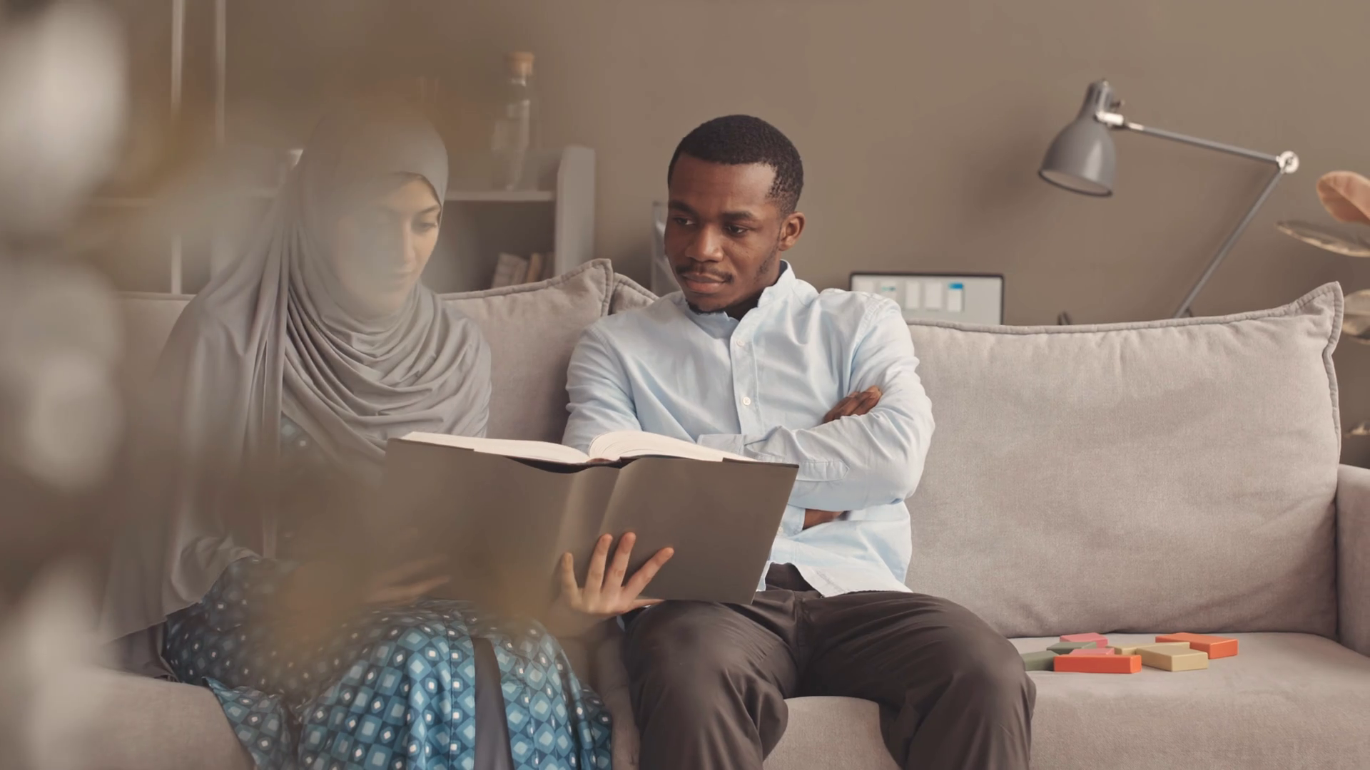 Intimate Moment: Young Couple Reading Quran Stock Footage SBV-346984468 ...