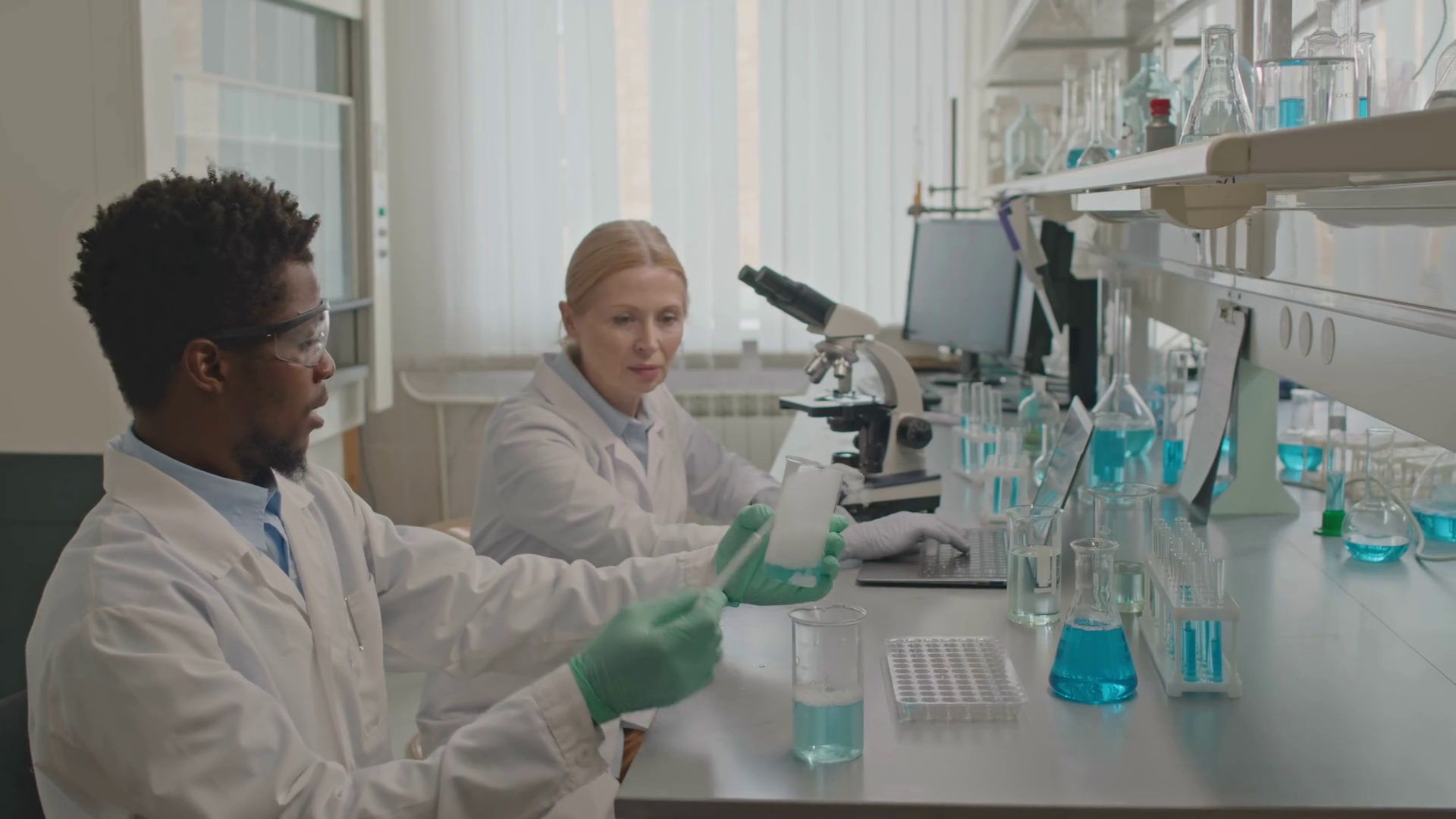 Medium Shot Of Two Multiethnic Male Female Stock Footage SBV-348589882 ...