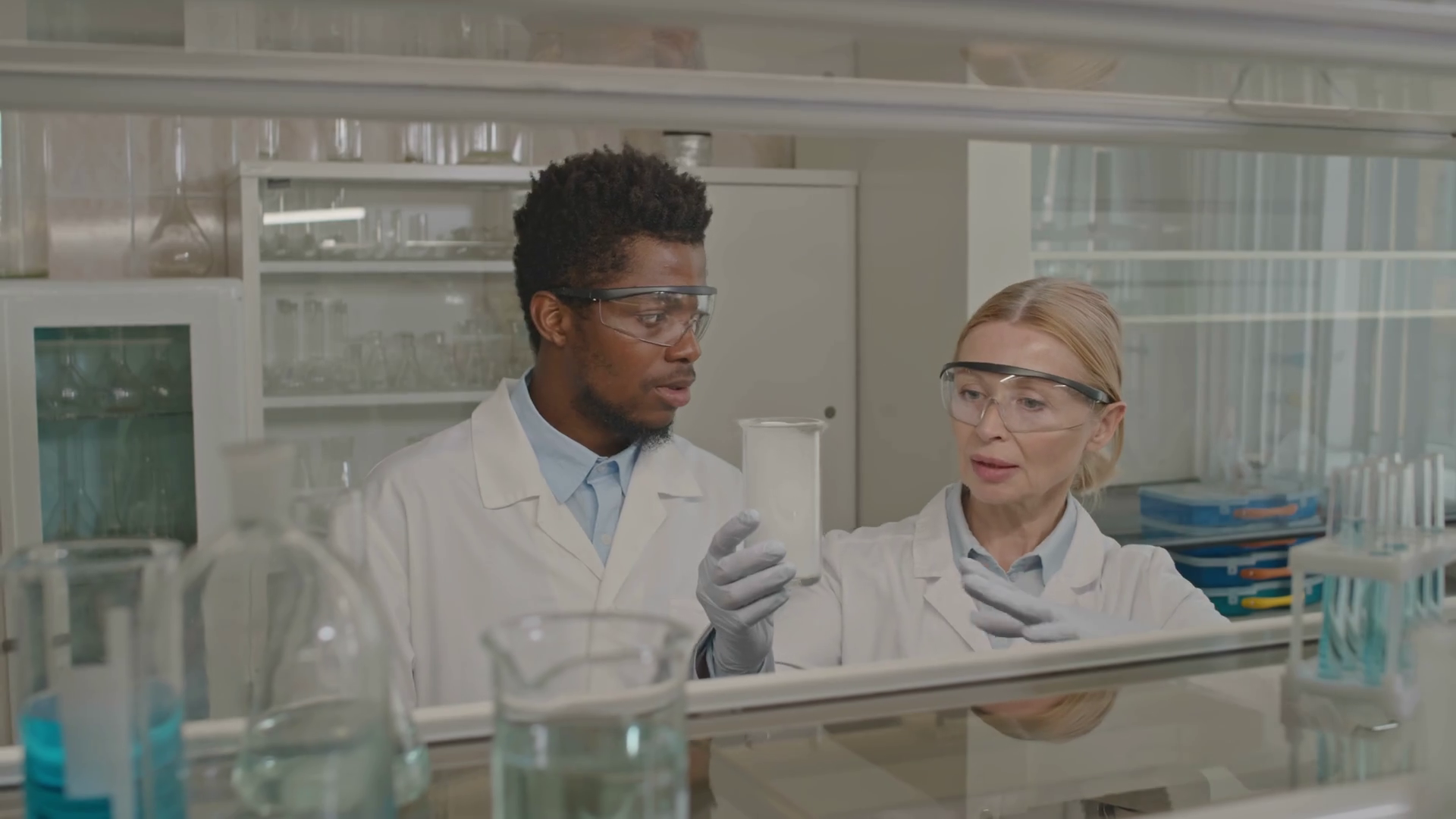 Chest Up Of Two Diverse Male Female Chemists Stock Footage SBV ...