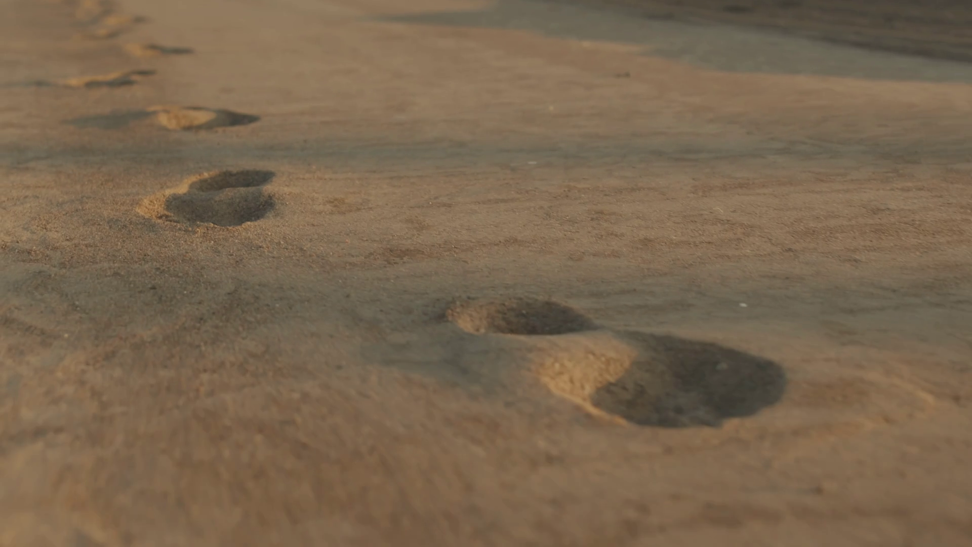 No People Dolly Shot Of Footsteps In Sand At Stock Footage SBV ...
