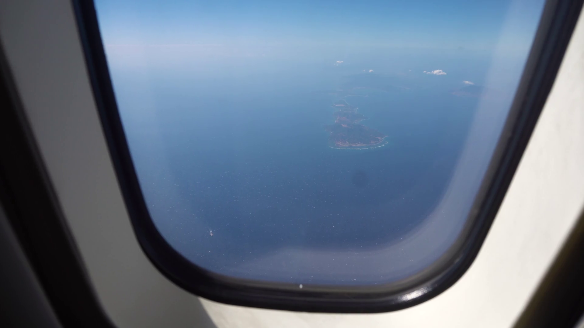Airplane Flying Over Blue Sea Island Looking Stock Footage SBV ...