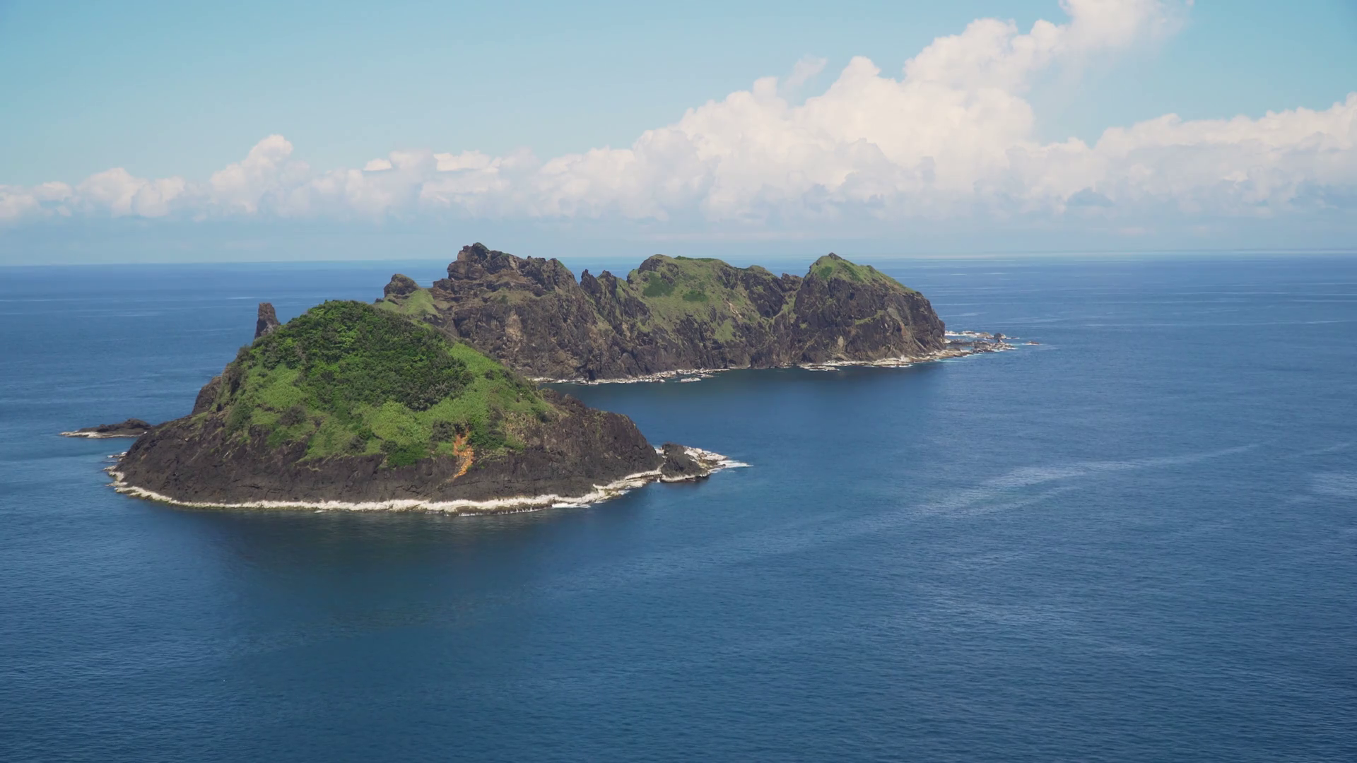 Small Rocky Islands In Sea Blue Sky Clouds Stock Footage SBV-347416237 - Storyblocks