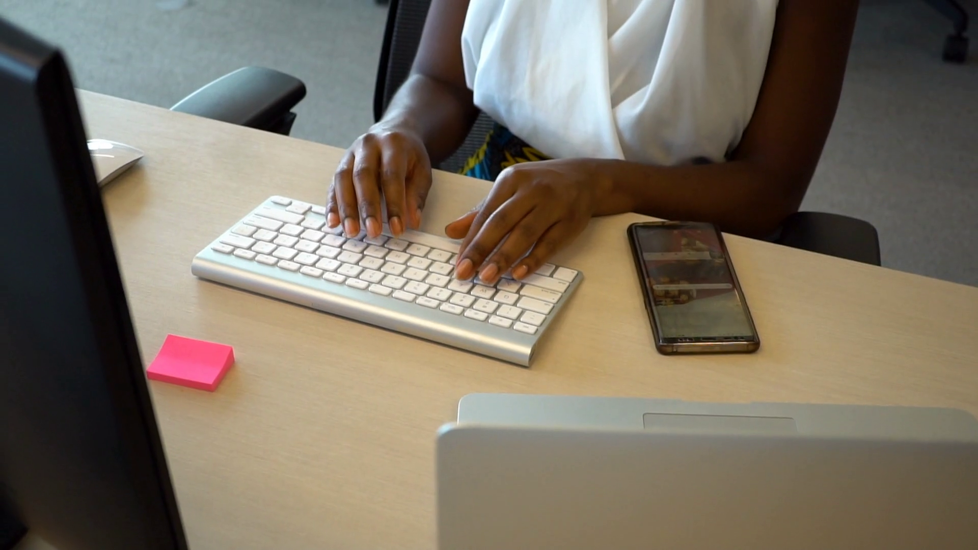 Young diverse businesswoman typing on computer keyboard, working hard ...