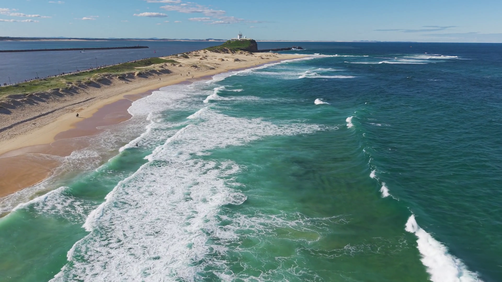 Aerial View Of Nobbys Beach Lighthouse Stock Footage SBV-352741733 ...