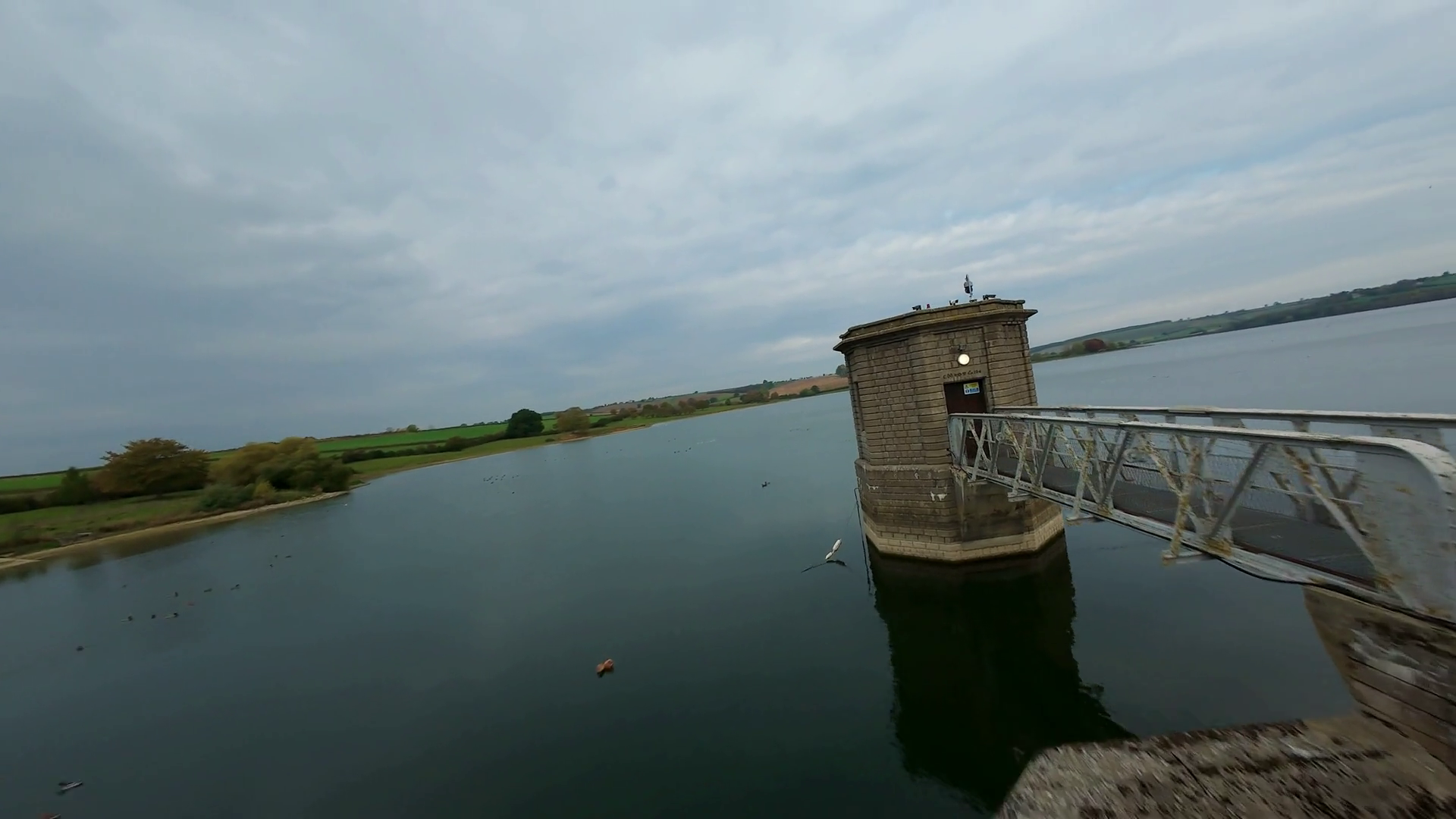 Aerial View Of Reservoir Structure Extending Stock Footage SBV ...