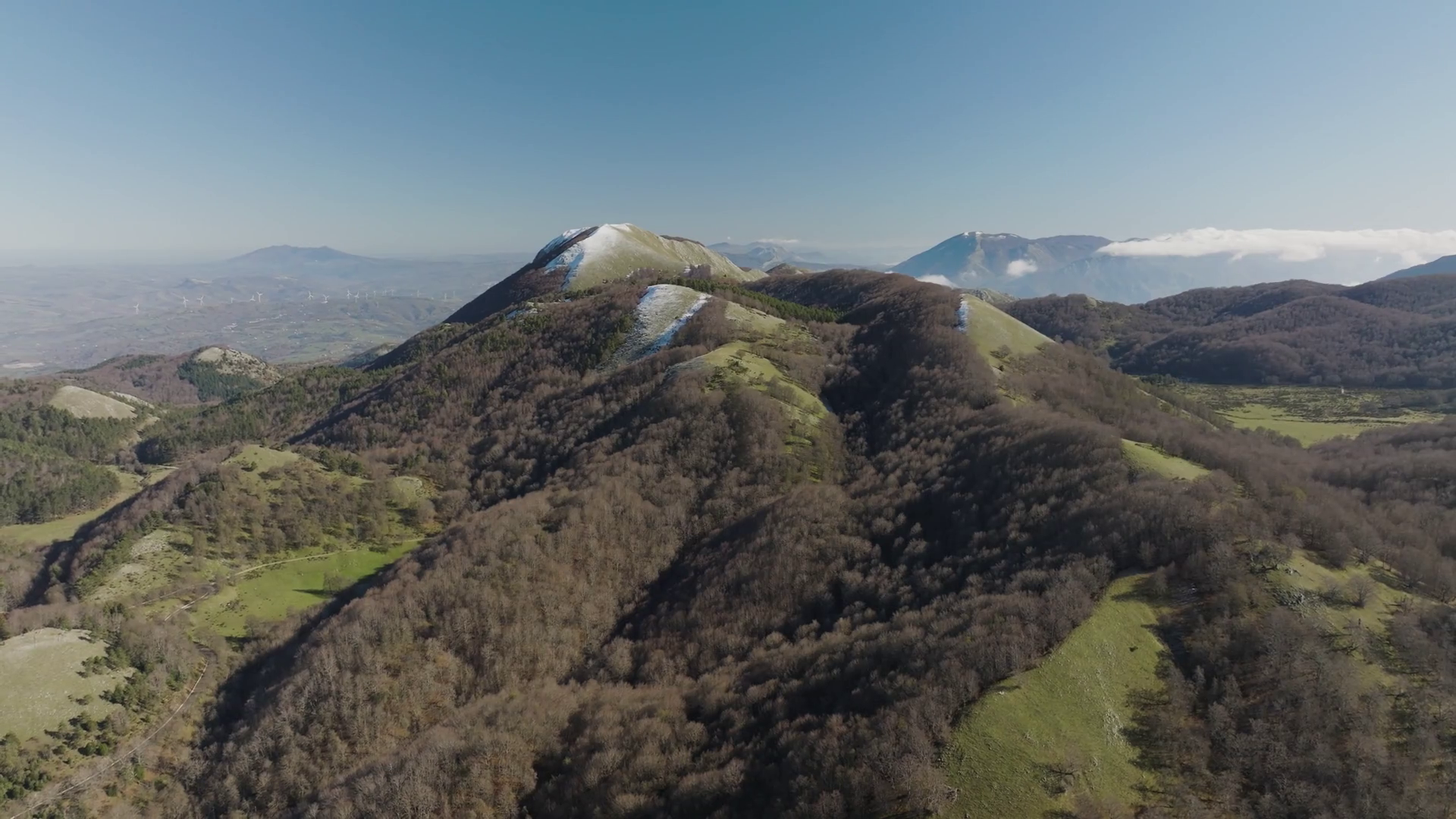 Aerial View Of Rolling Mountains Around Stock Footage SBV-353391315 ...
