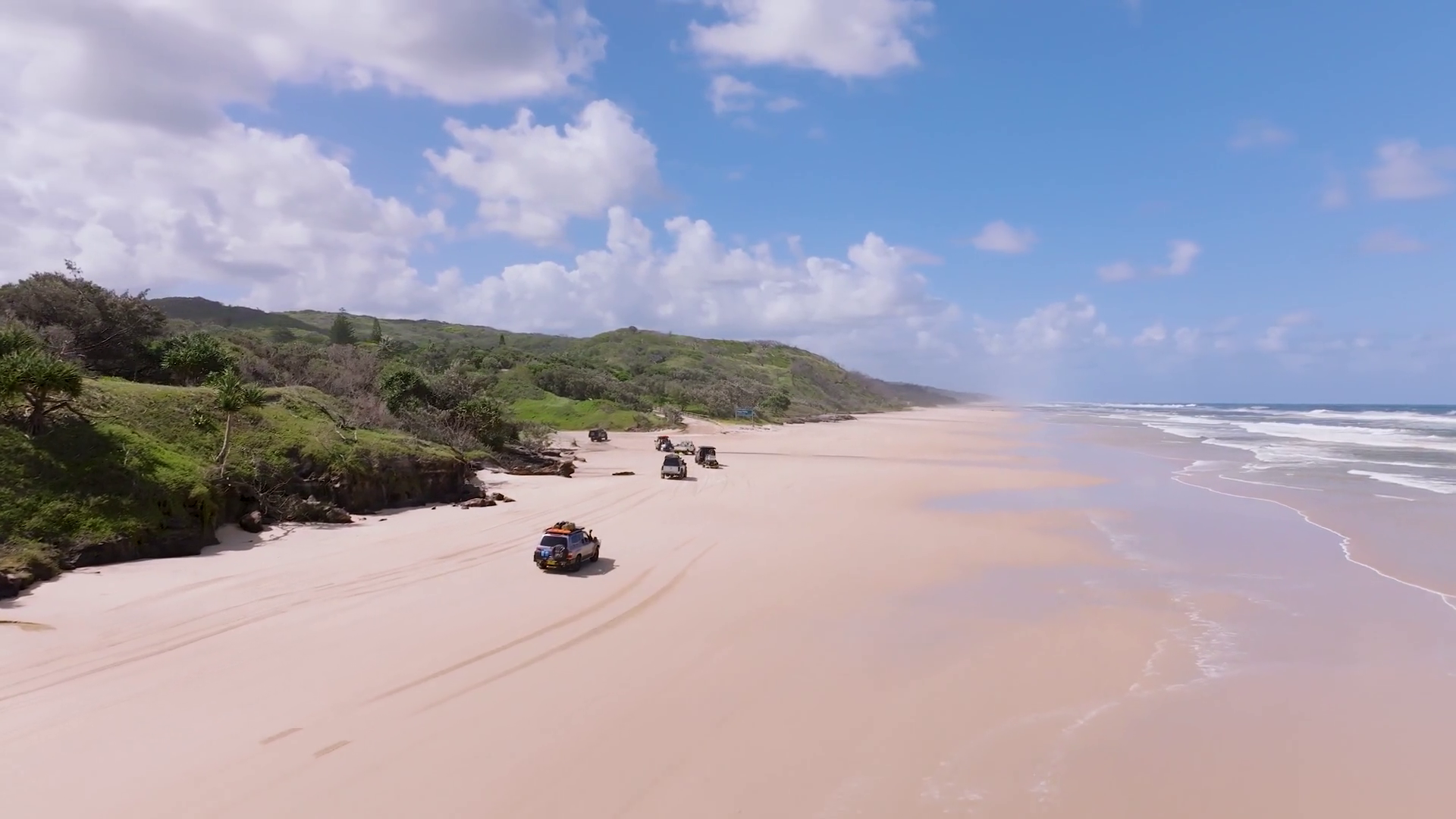 Aerial View Of Jeep On Sandy Beach Ocean Stock Footage SBV-351718709 ...