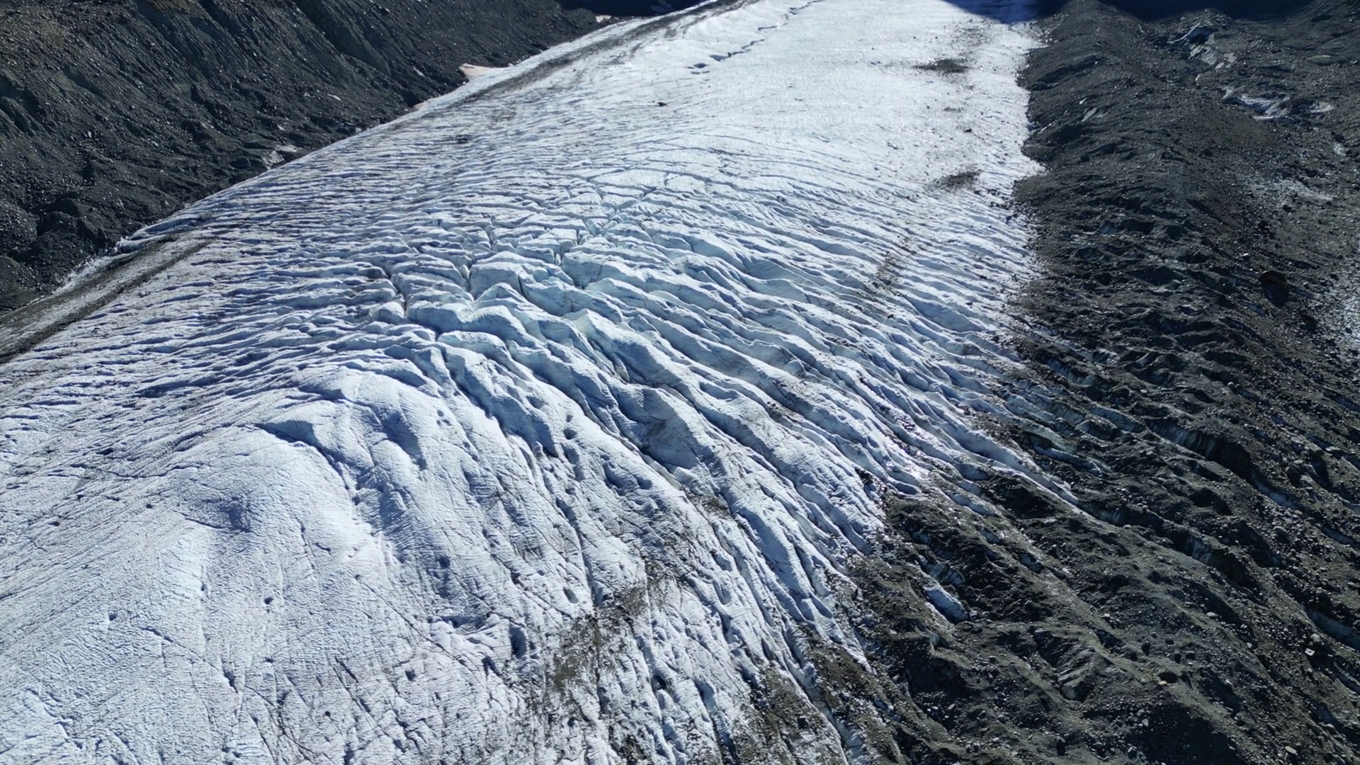 Aerial View Of Glacier With Ice Crevices Stock Footage SBV-351766432 ...