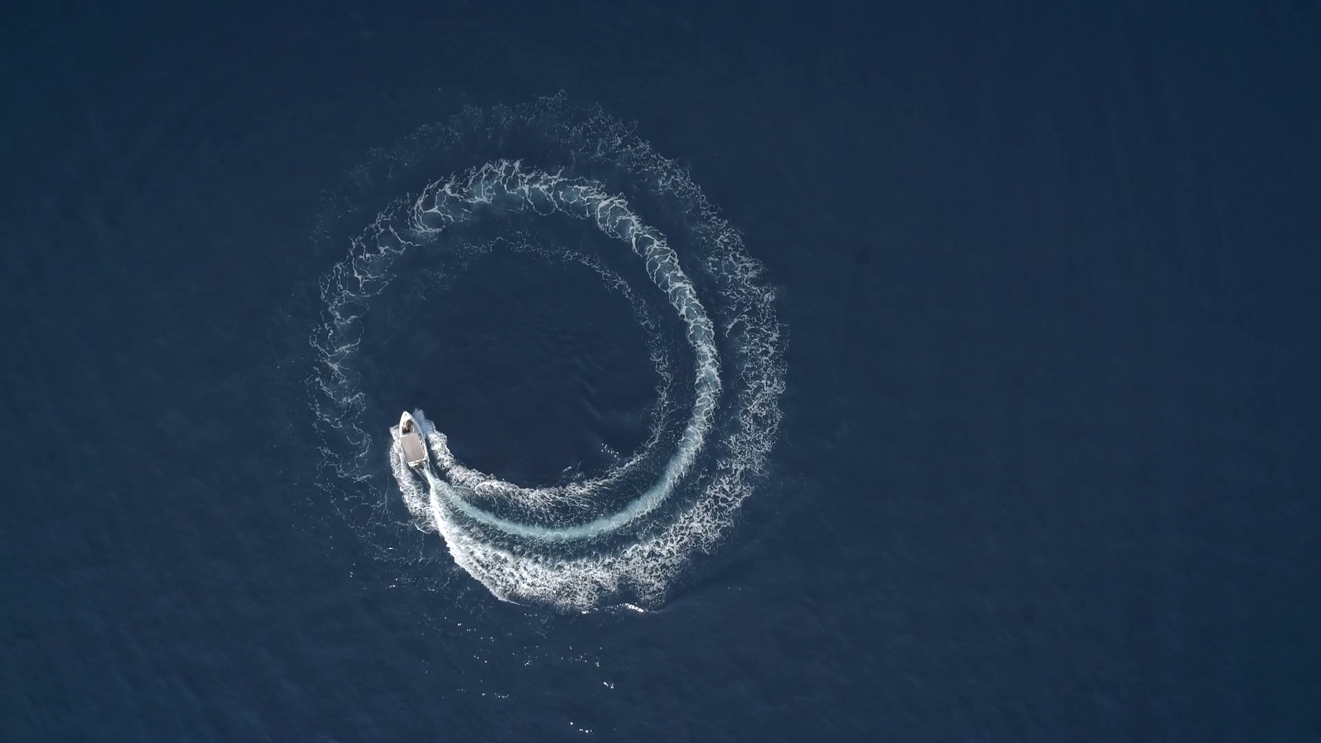 Aerial View Of Boat Driving In Circles Stock Footage SBV-338951551 ...