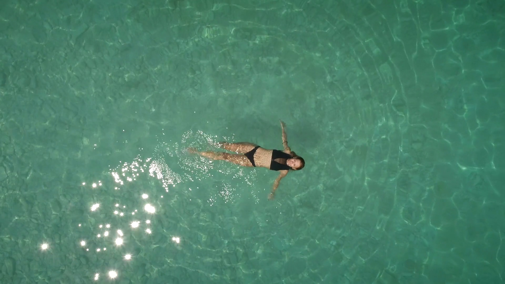 Aerial View Of Person Floating In Water At Stock Footage SBV-338951534 ...