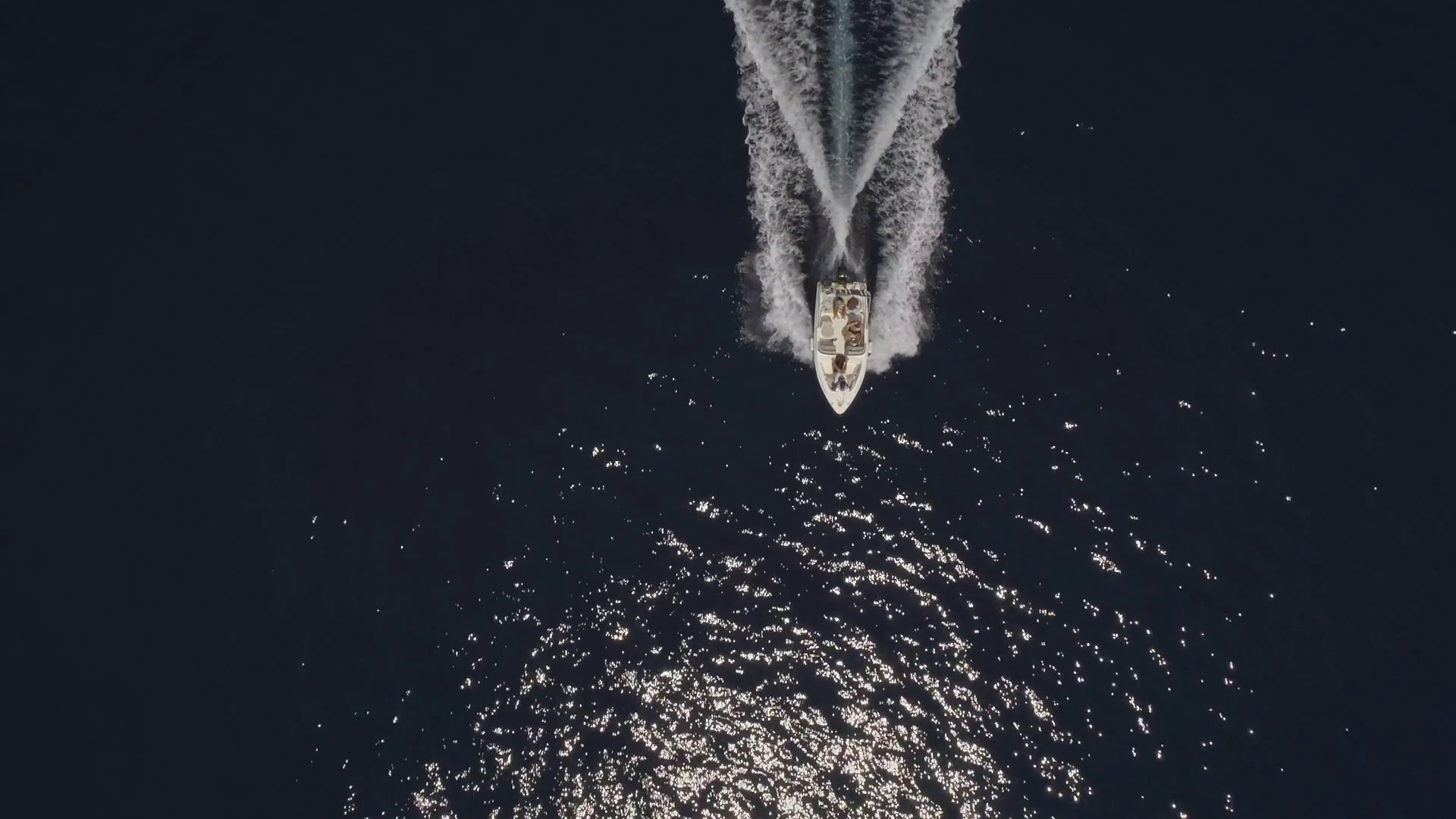 Aerial View Of Small Boat With Trailing Wake Stock Footage SBV ...