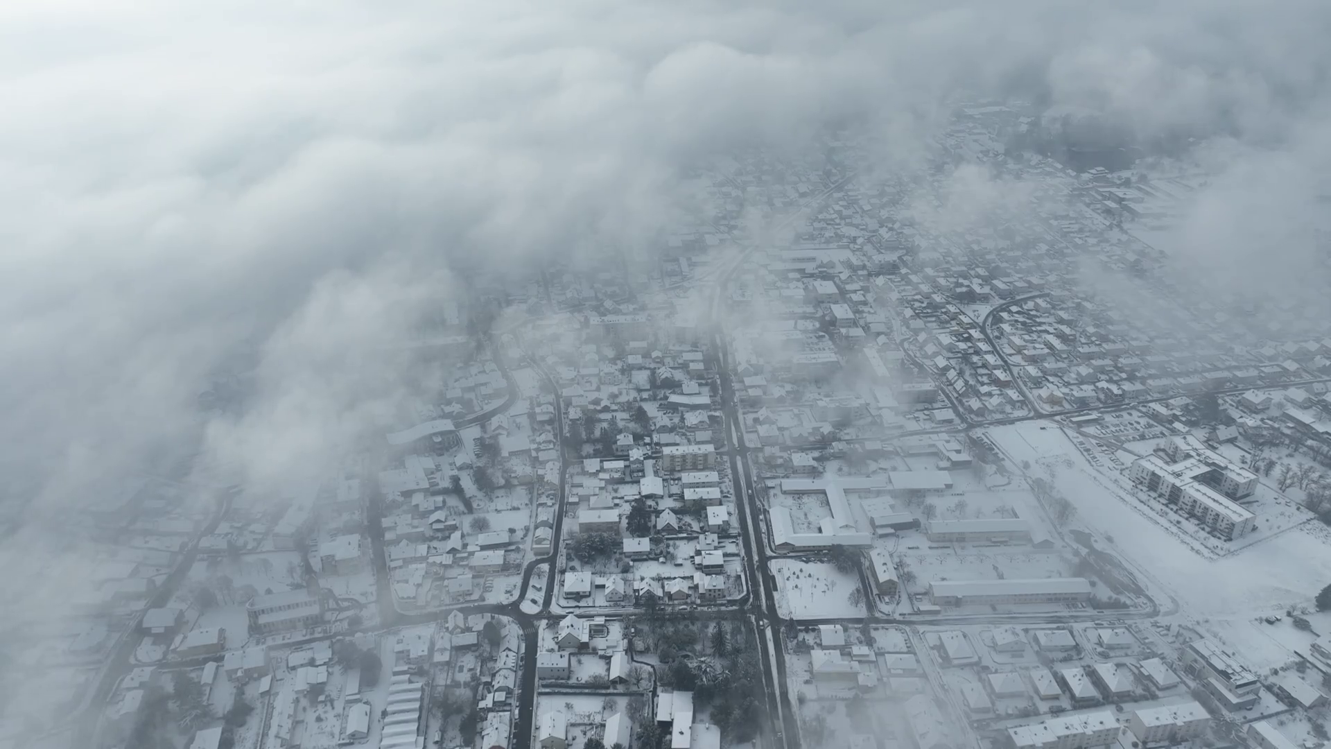 Aerial View Of Falling Snow In Residential Stock Footage SBV-348907157 ...