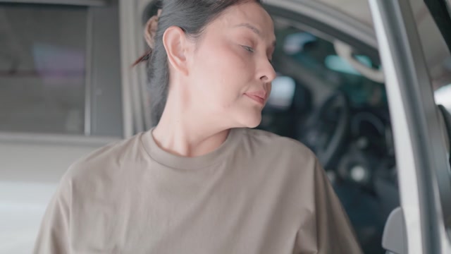 Woman Getting Out Of Car Stock Footage: Royalty-Free Video Clips ...