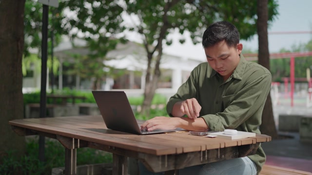 Table Using Laptop Stock Footage: Royalty-Free Video Clips - Storyblocks