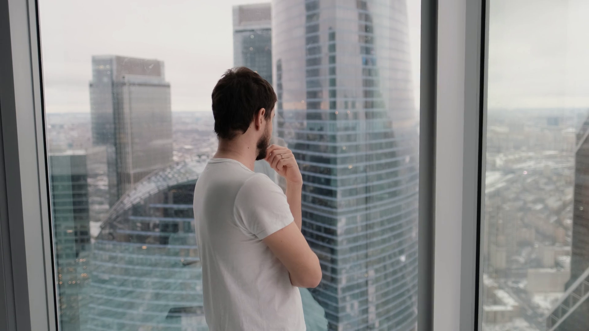 Contemplative Man Gazes Out Window In Modern Stock Footage SBV ...