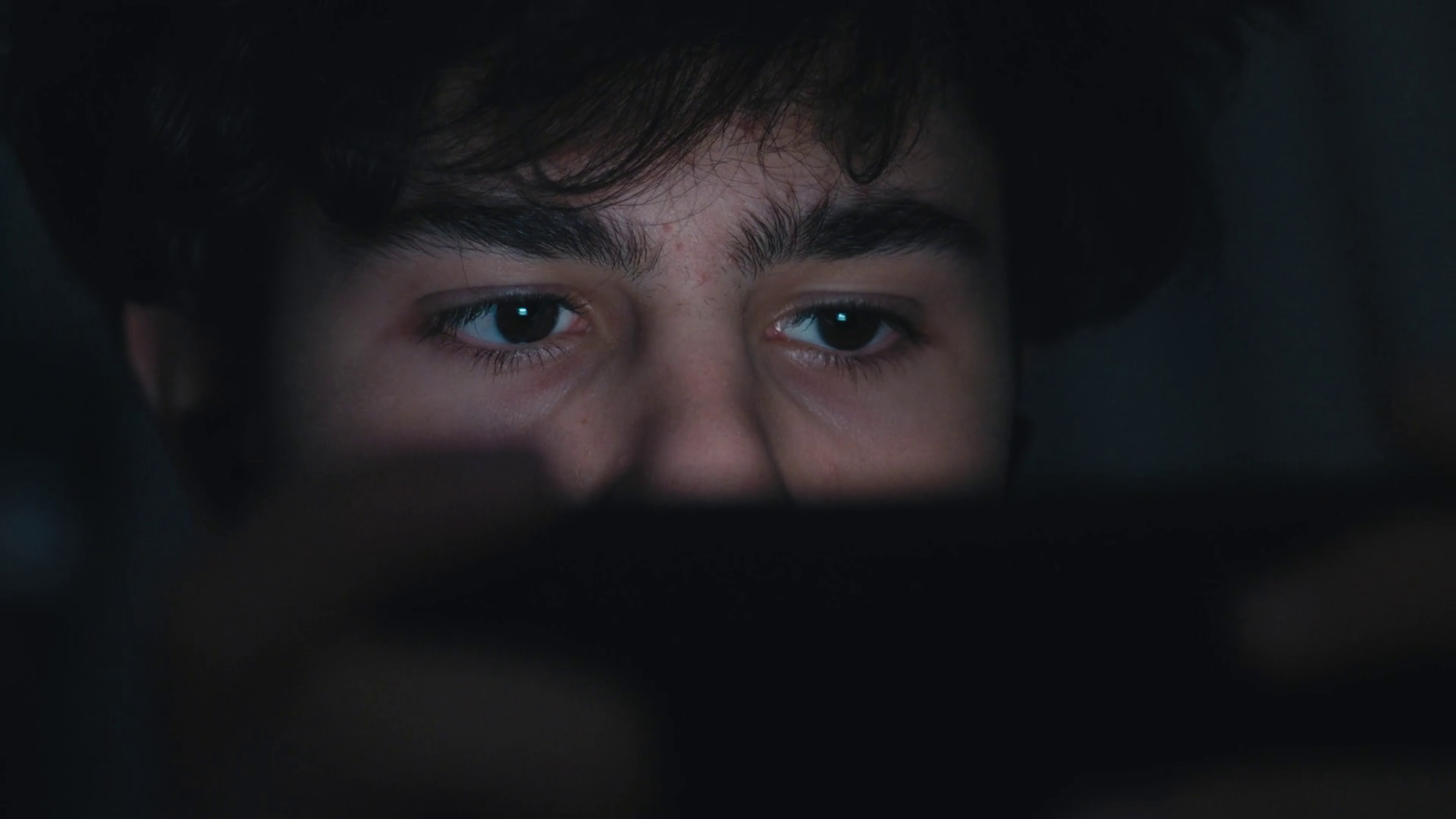 Gazing Intently At Screen Amidst Dim Stock Footage SBV-353067858 ...