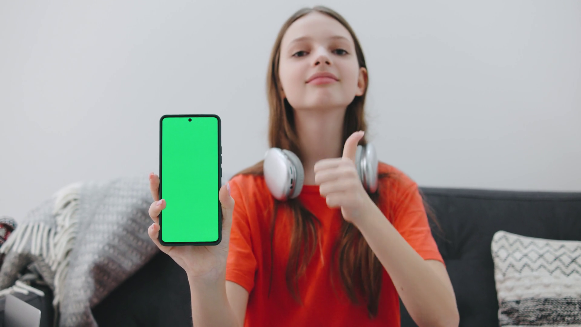 Young Girl With Headphones Shows Smartphone Stock Footage Sbv 351985183 7884